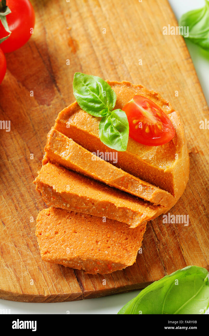 Roasted vegetable chickpea pate on cutting board Stock Photo - Alamy
