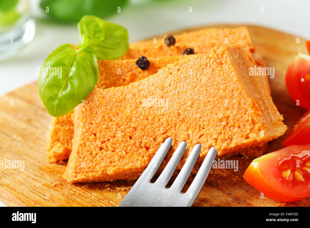 Roasted vegetable chickpea pate on cutting board Stock Photo - Alamy