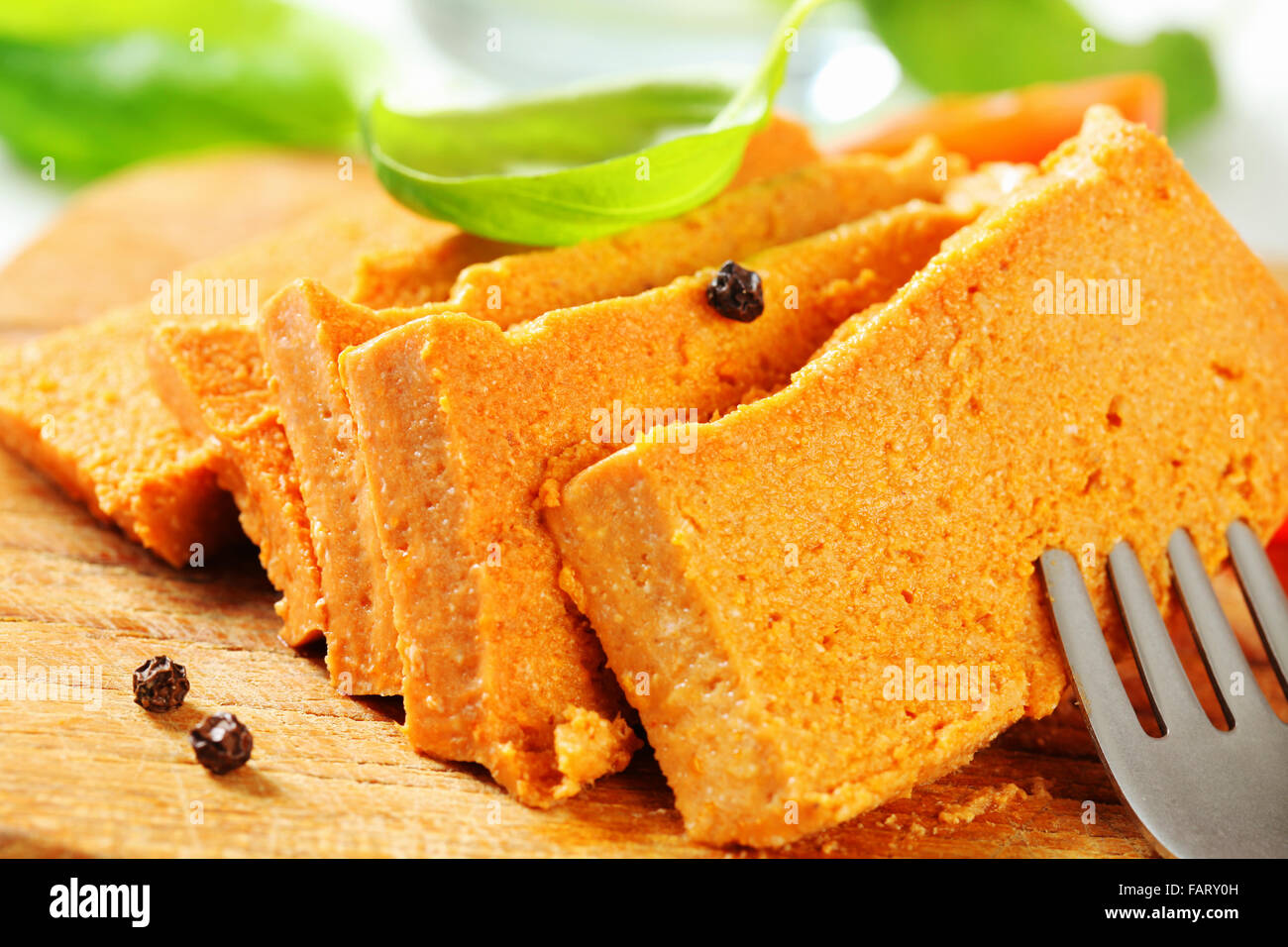 Roasted vegetable chickpea pate on cutting board Stock Photo - Alamy