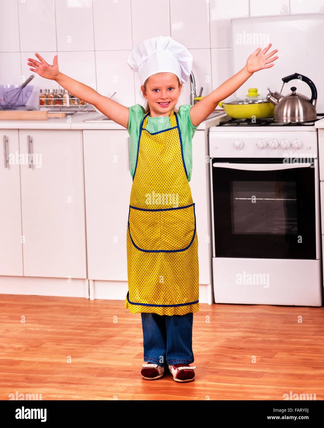 Child cooking at kitchen Stock Photo - Alamy