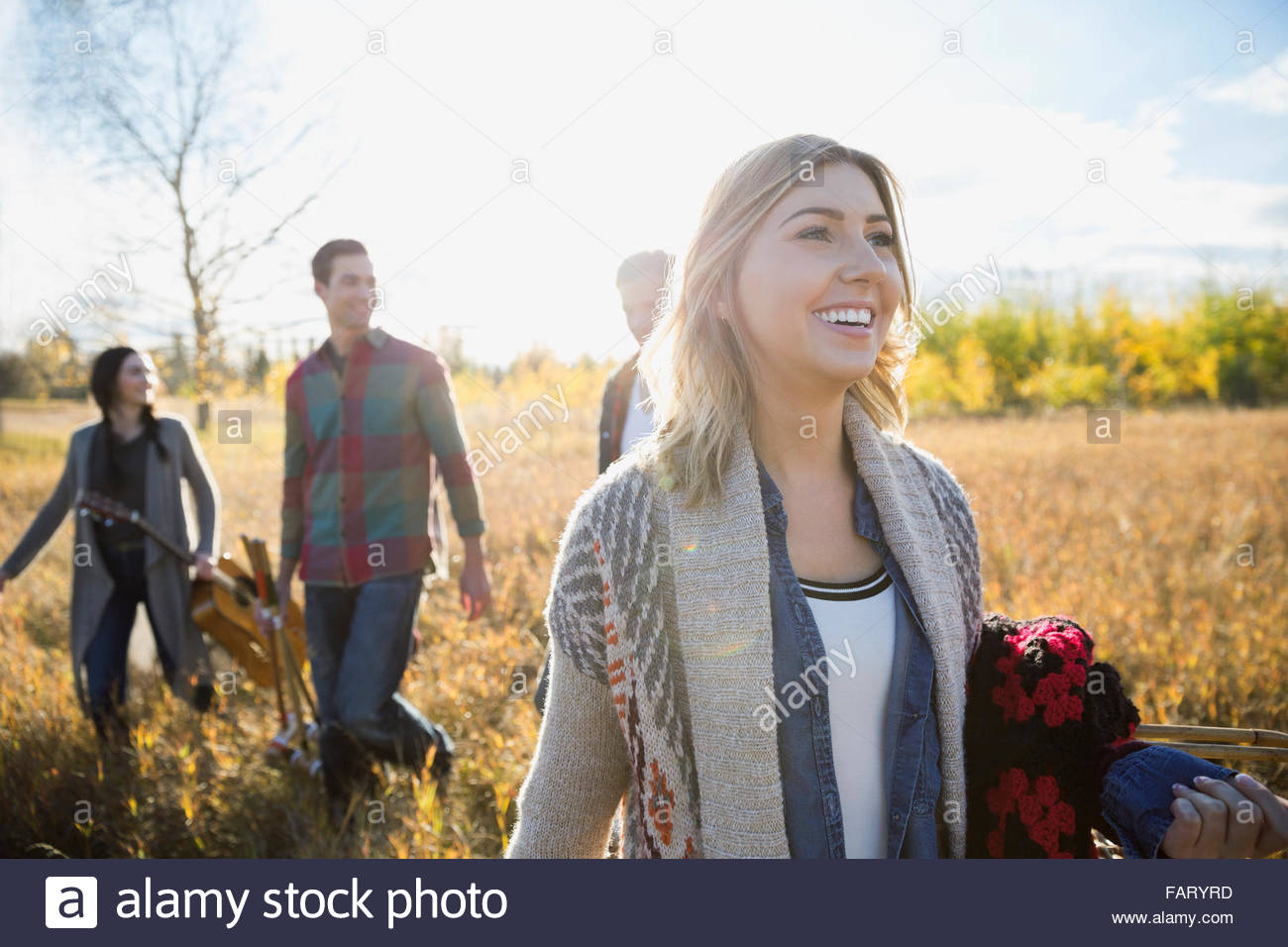 Walking smiling field hi-res stock photography and images - Alamy