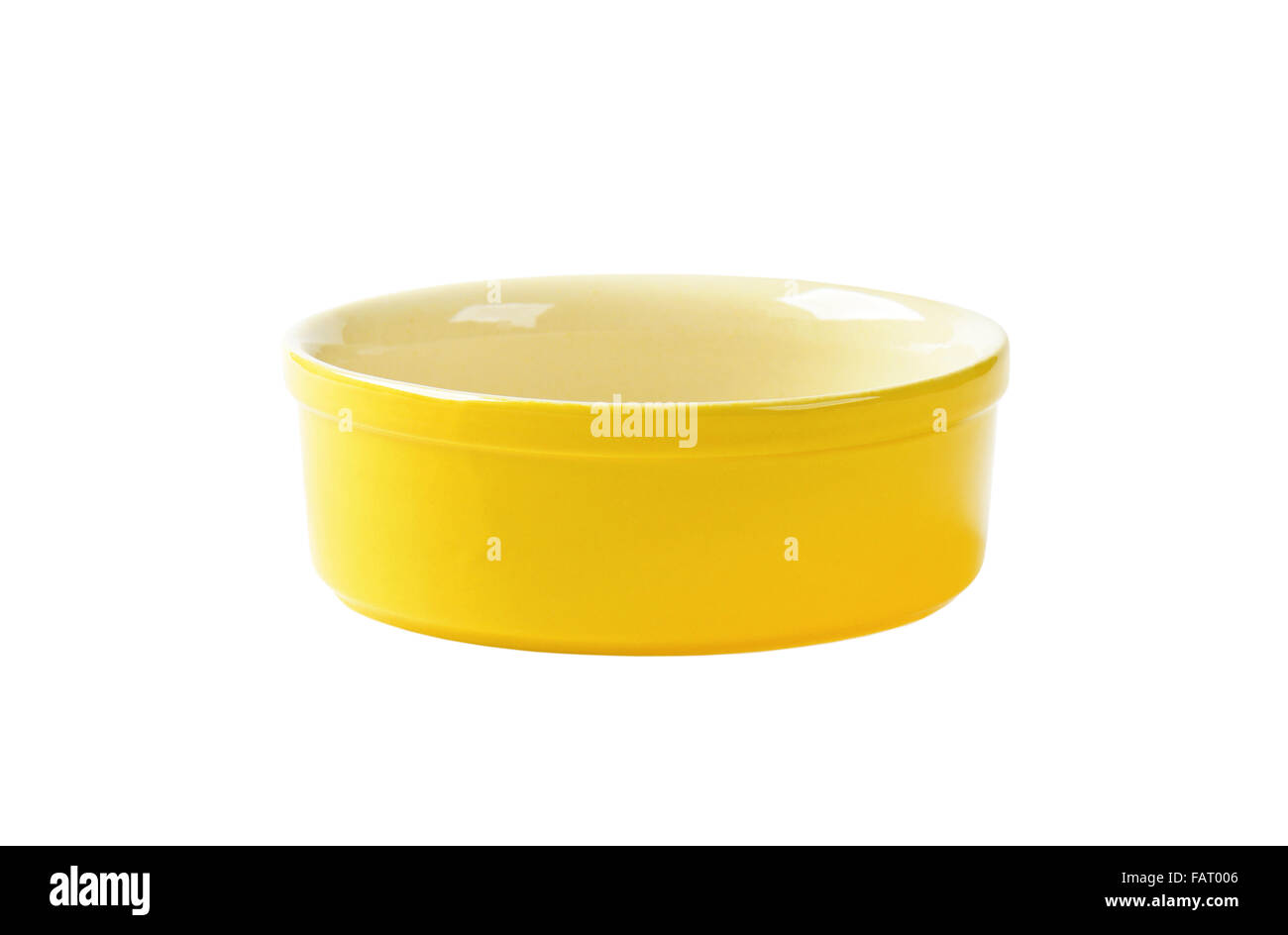 Small empty yellow souffle dish Stock Photo - Alamy