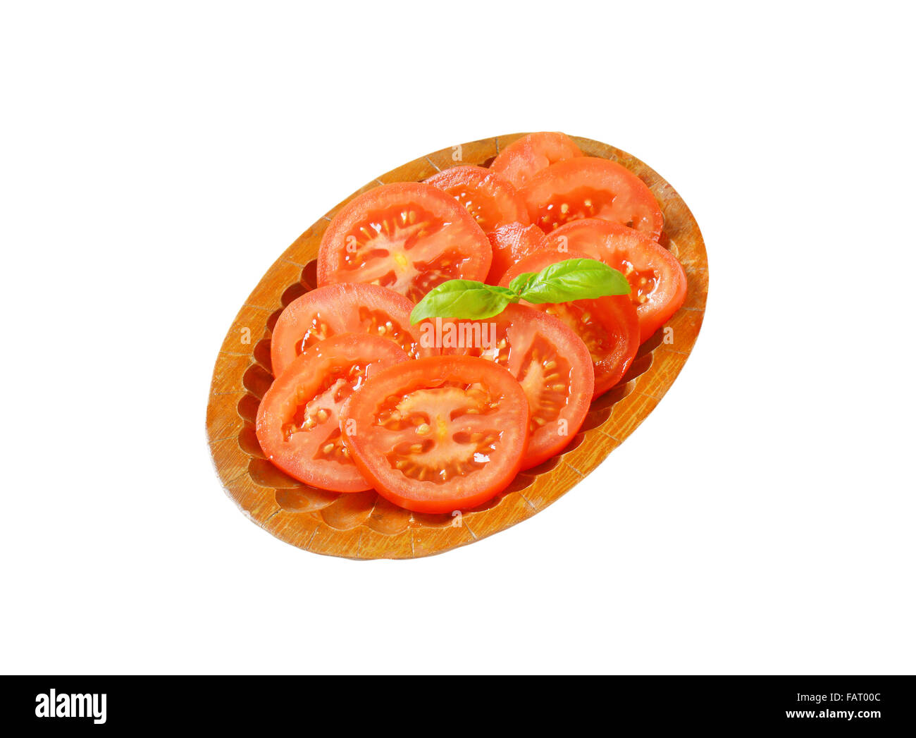 Ripe red tomato sliced Cut Out Stock Images & Pictures - Alamy