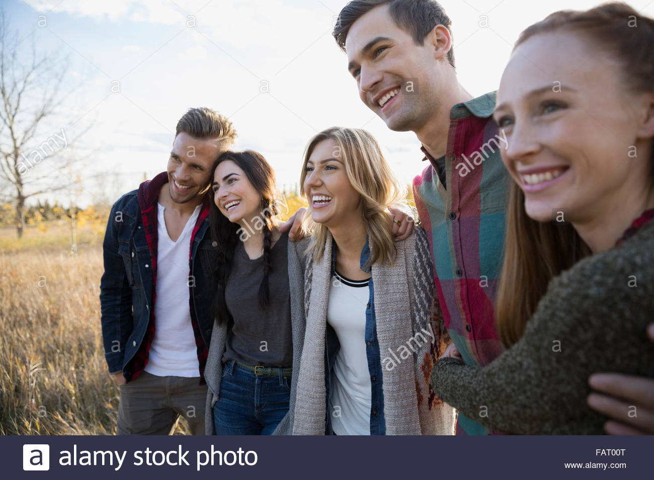 Row of friends hi-res stock photography and images - Alamy