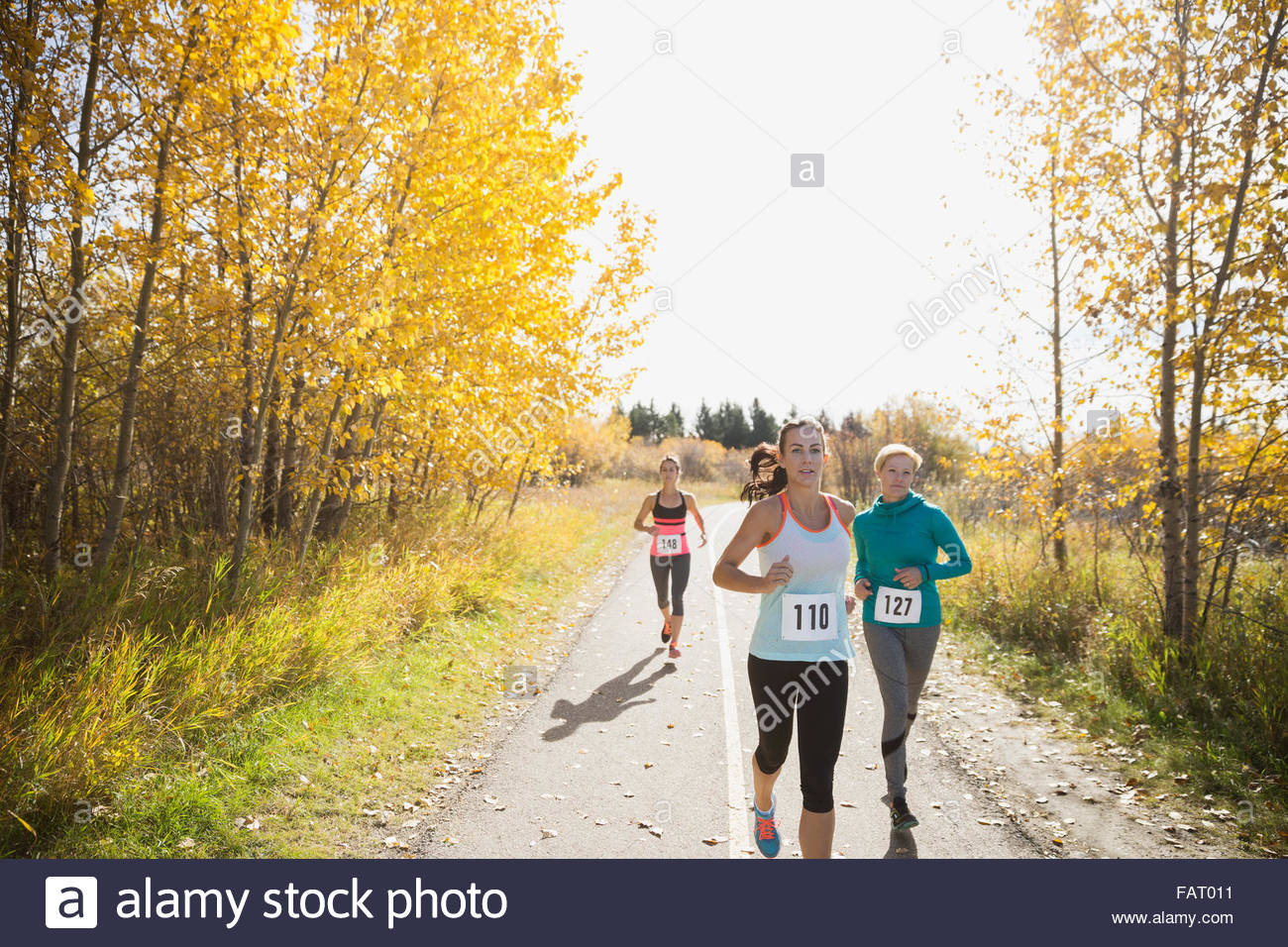 Three runners hi-res stock photography and images - Alamy