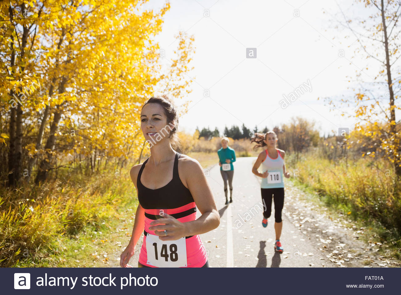 Three runners hi-res stock photography and images - Alamy