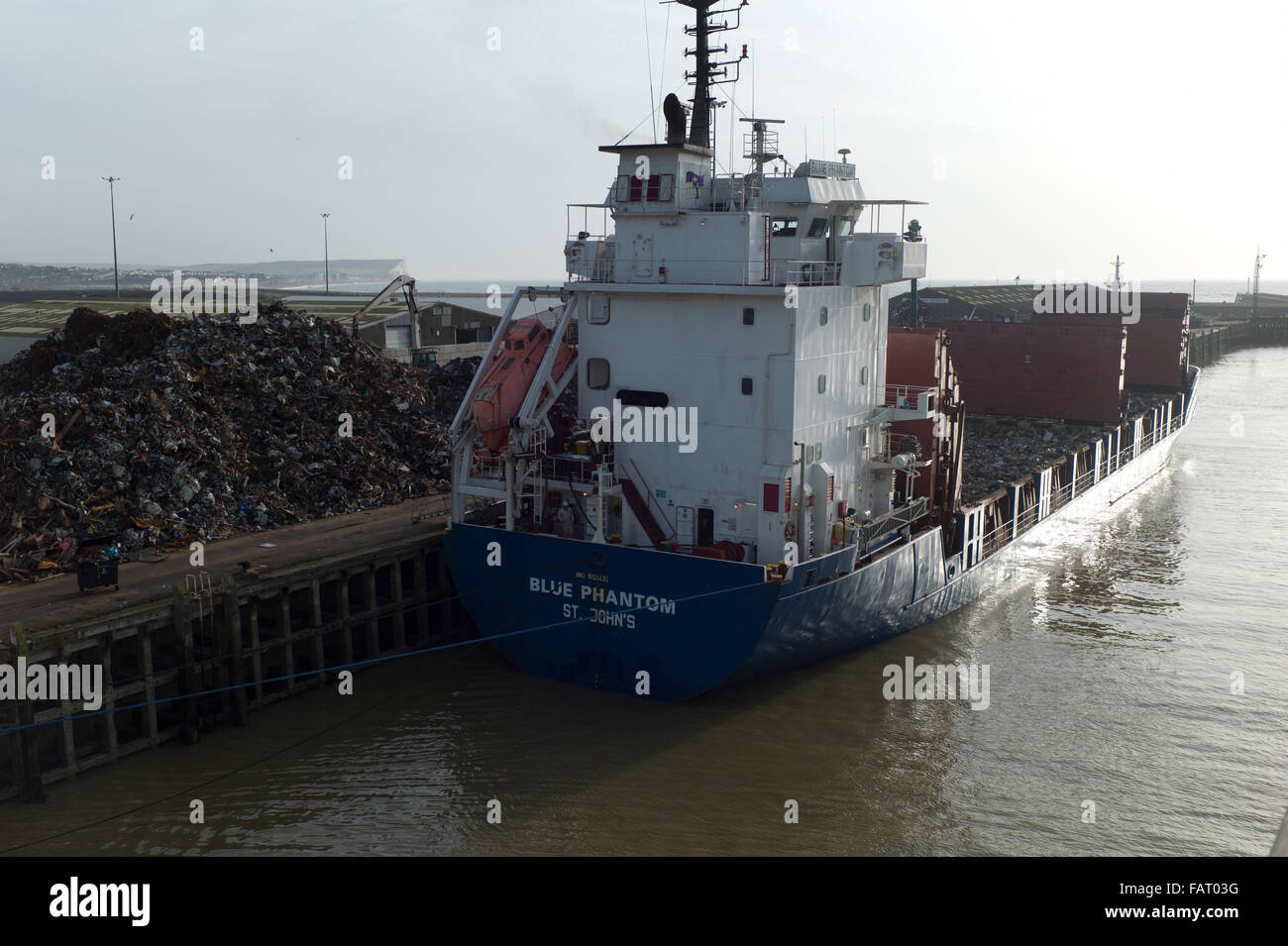 Cargo ship in harbor loading scrap metal, Newhaven, UK Stock Photo - Alamy