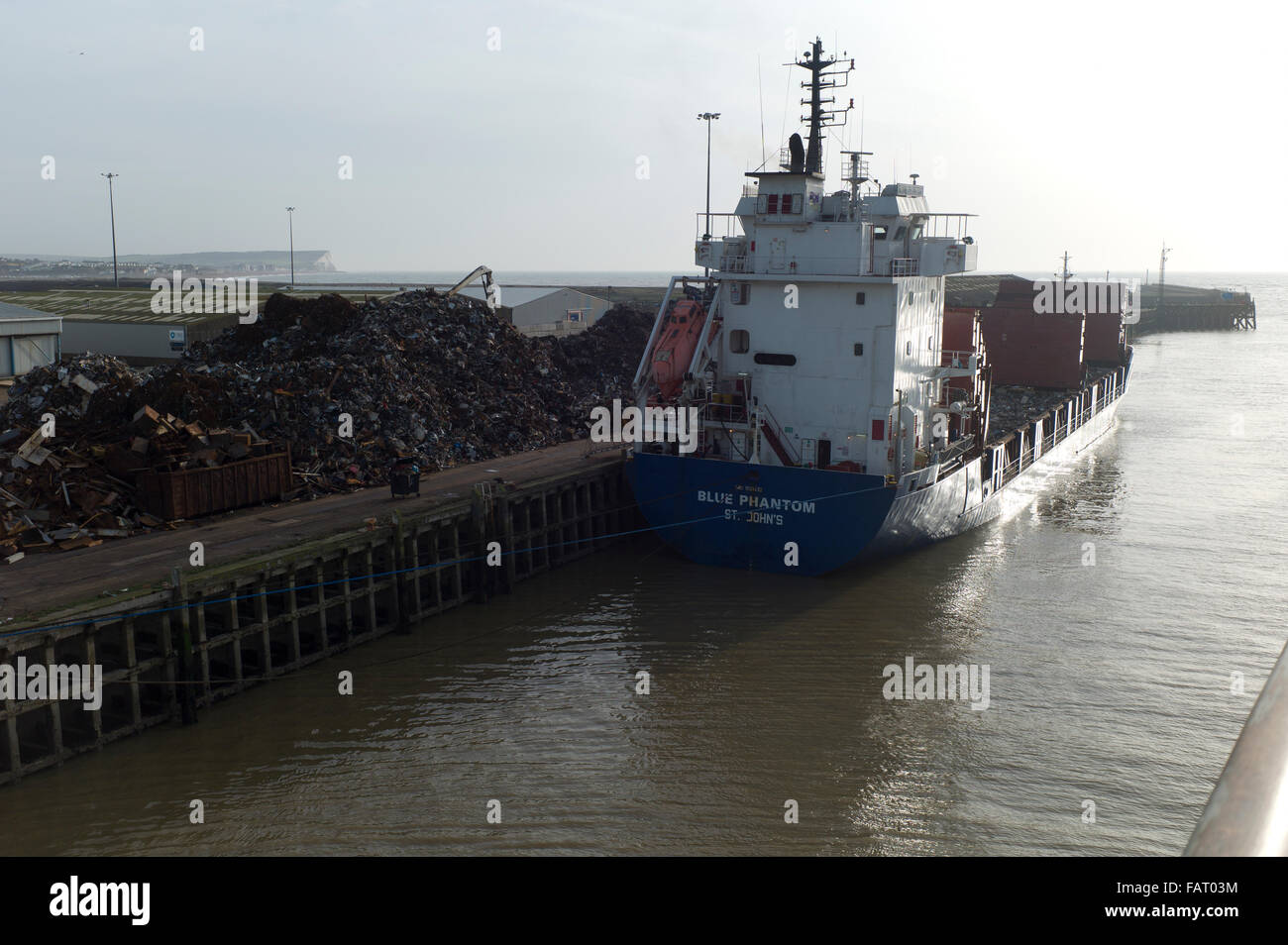 Cargo ship in harbor loading scrap metal, Newhaven, UK Stock Photo - Alamy