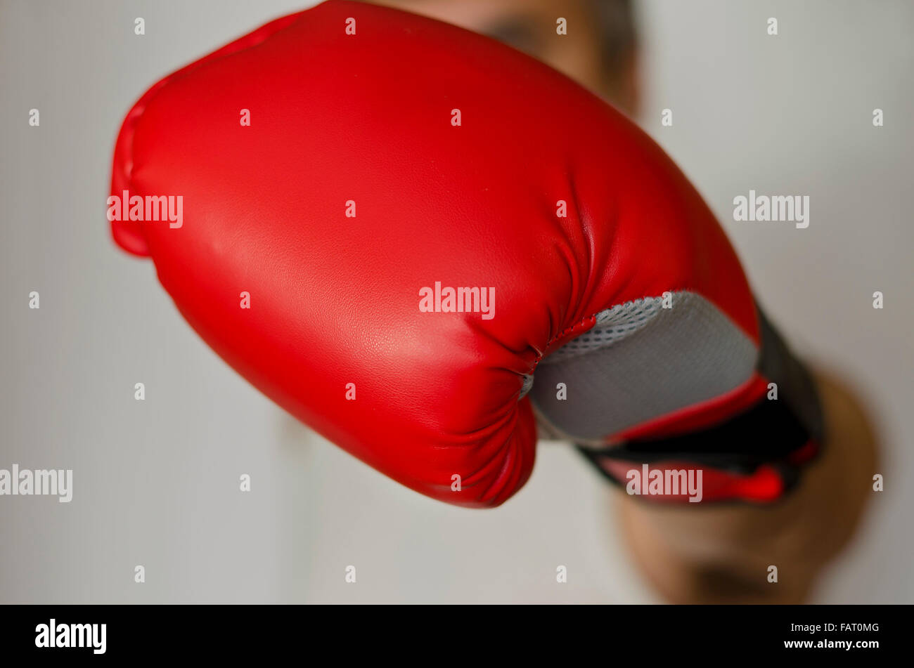 Boxing glove headed into the front of you Stock Photo - Alamy