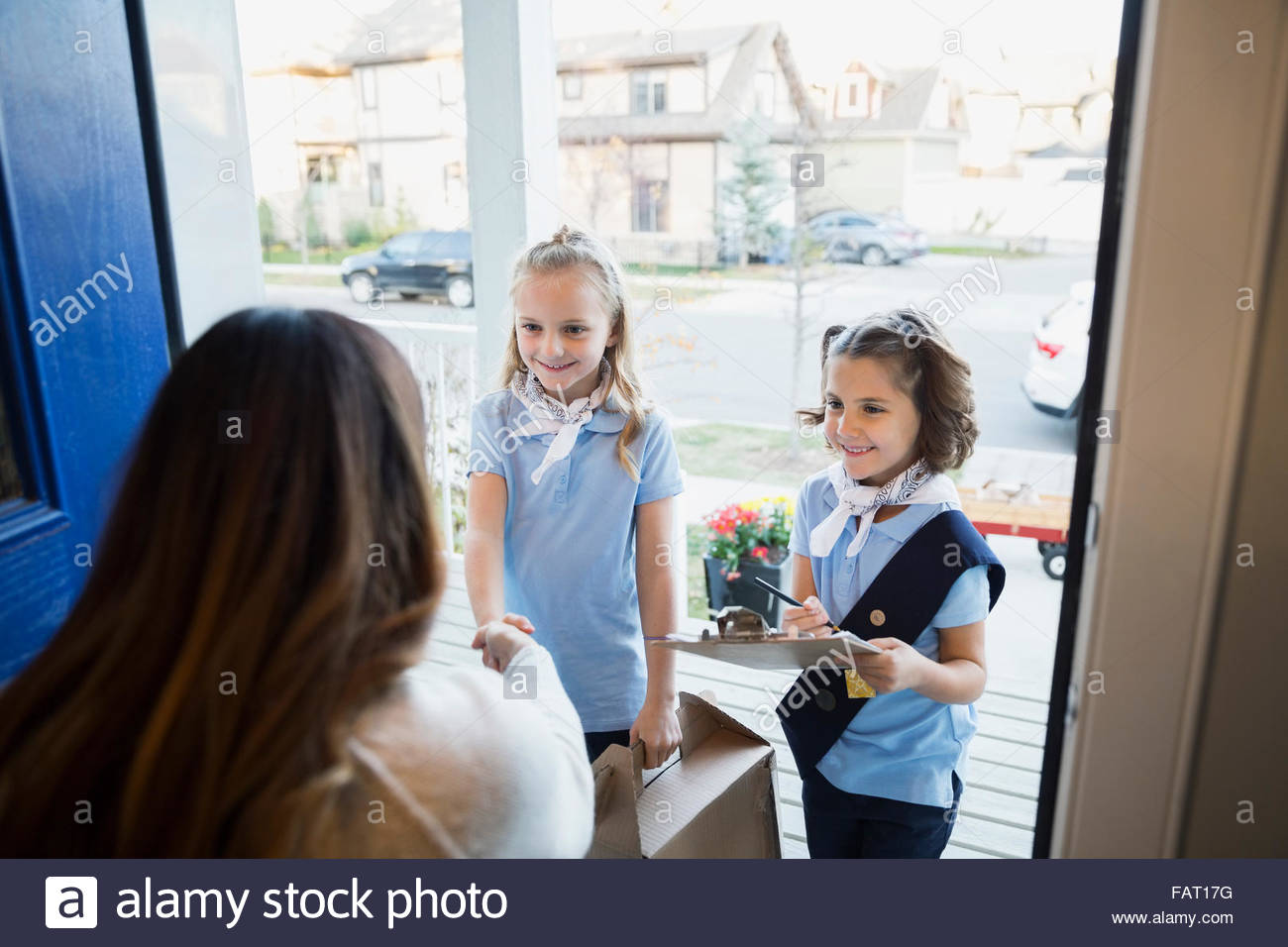 Girl scouts selling cookies hi-res stock photography and images - Alamy