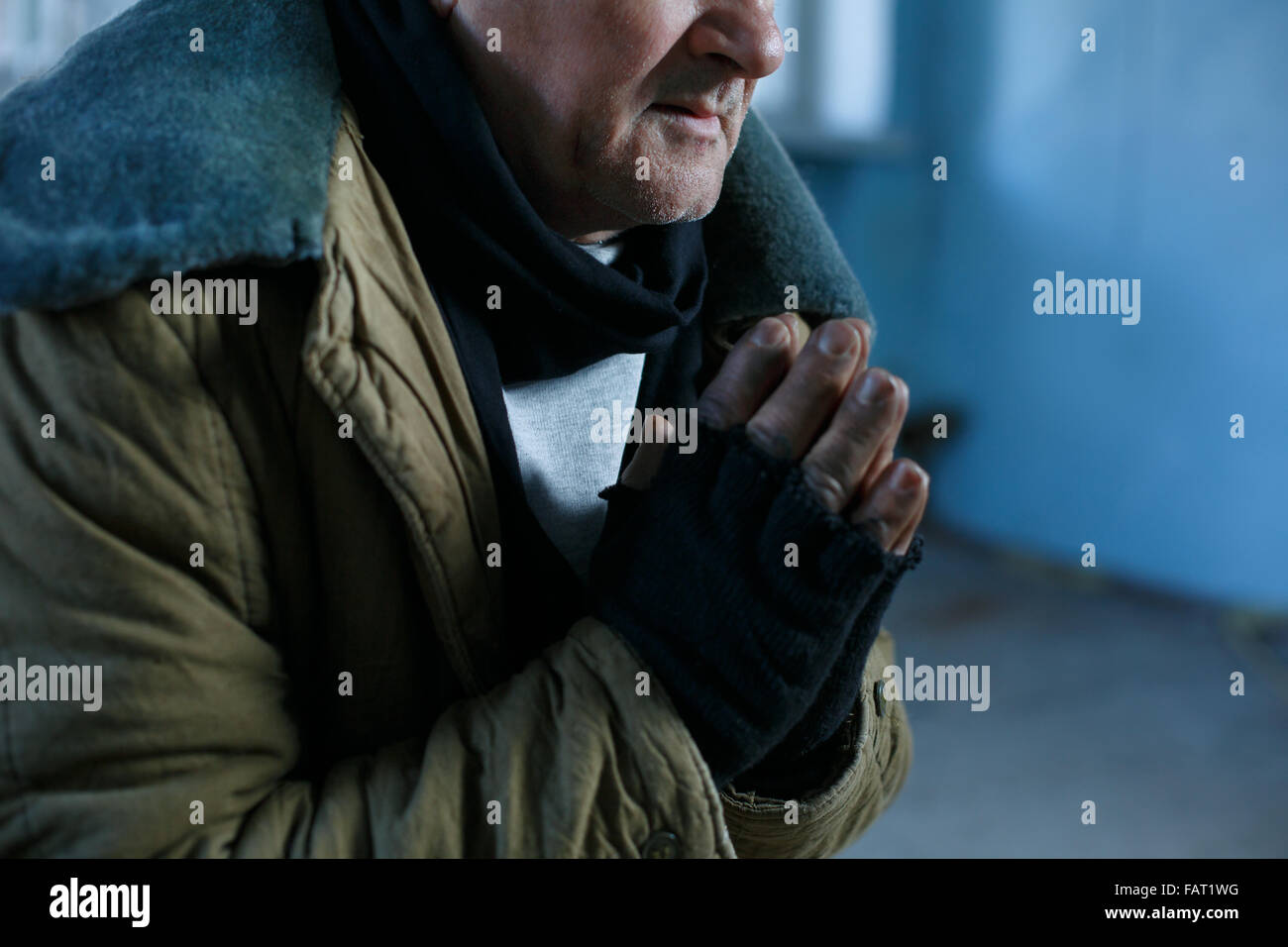 Old homeless man is praying for help Stock Photo - Alamy