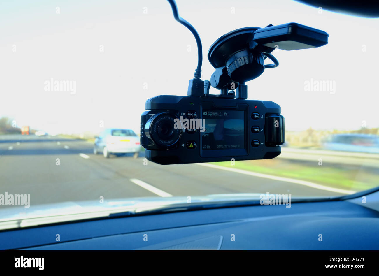 Driving a car with a dashcam video camera watching the road ahead Stock ...