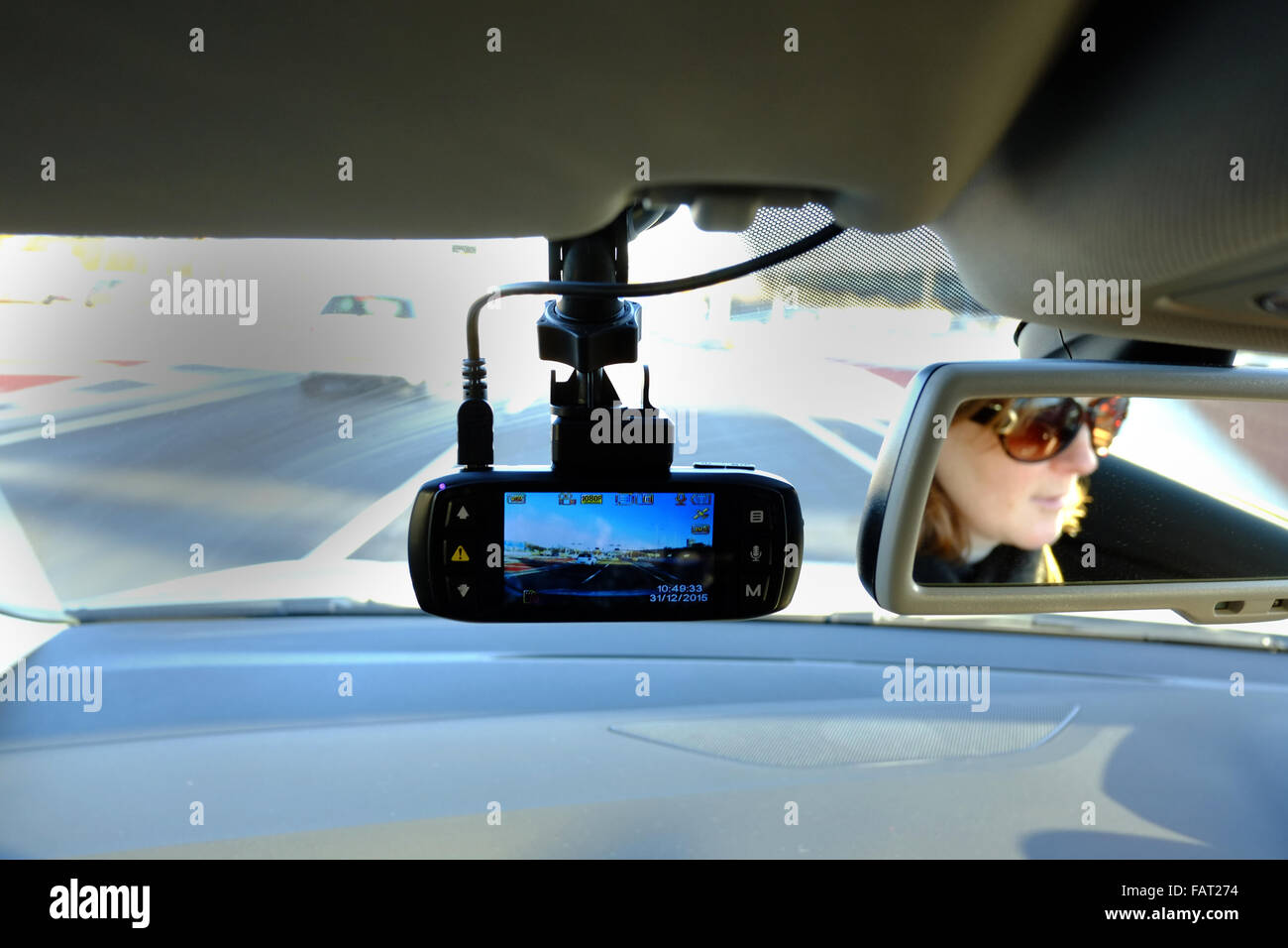 Driving a car with a dashcam video camera watching the road ahead Stock ...
