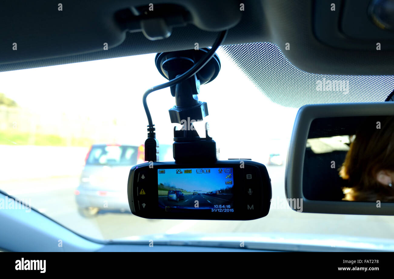 Driving a car with a dashcam video camera watching the road ahead Stock ...