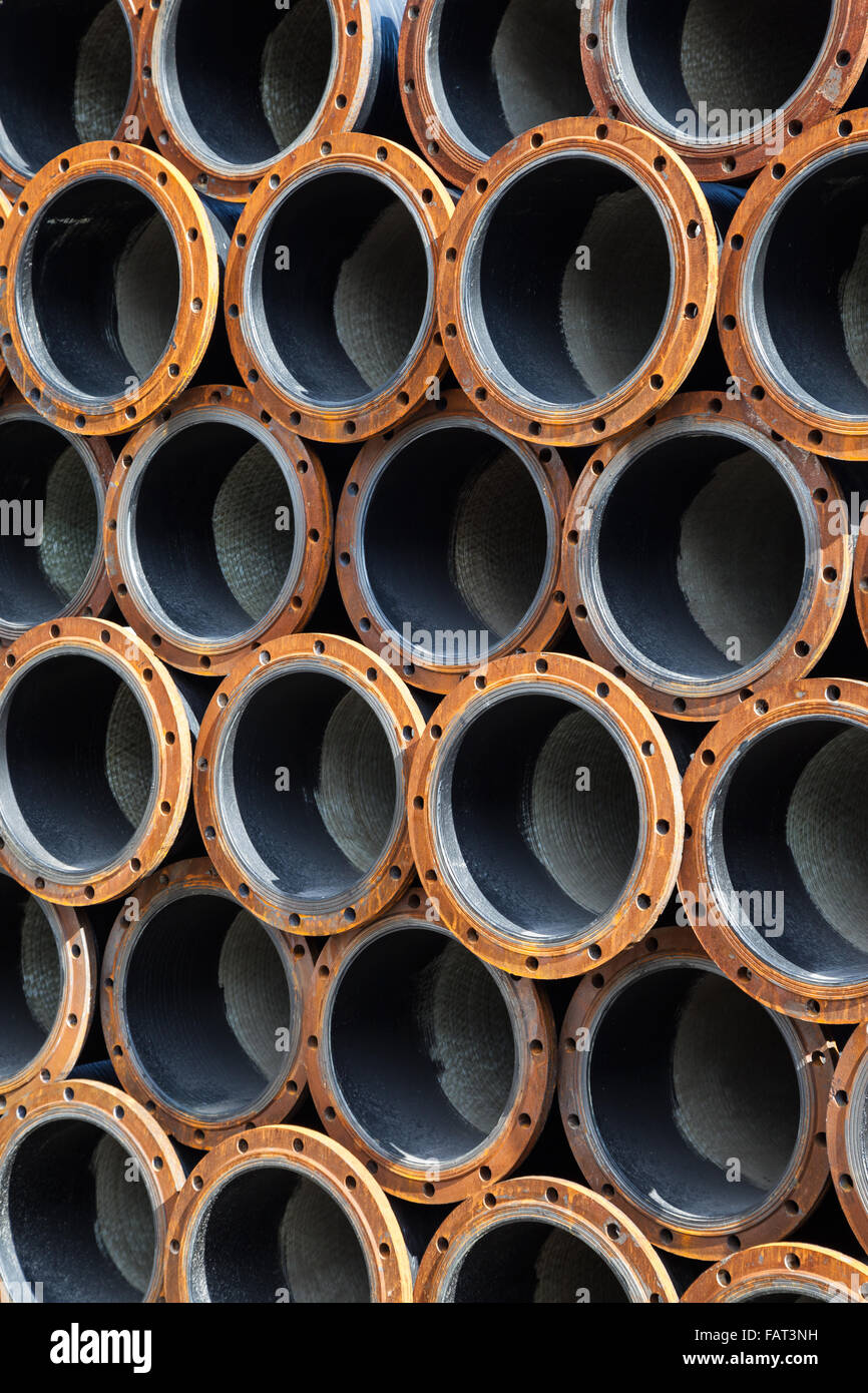Stacked steel pipe industrial texture background vertical Stock Photo ...