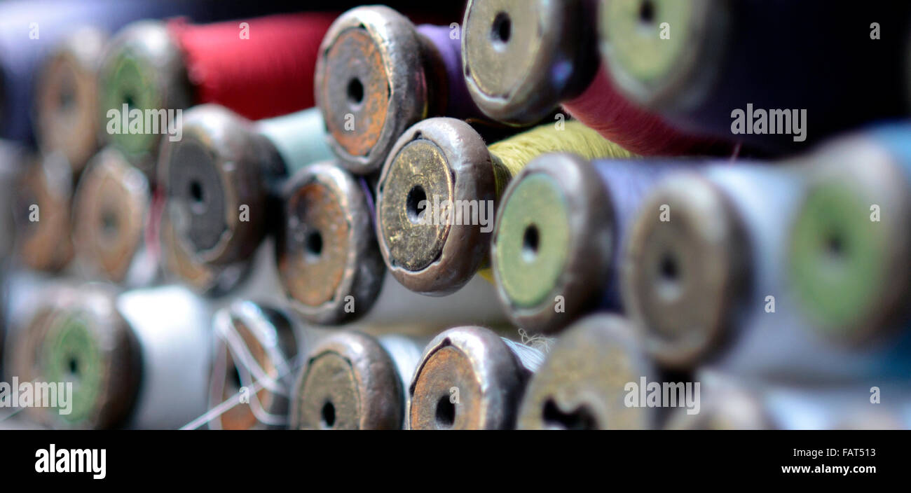 Wooden cotton reels hi-res stock photography and images - Alamy