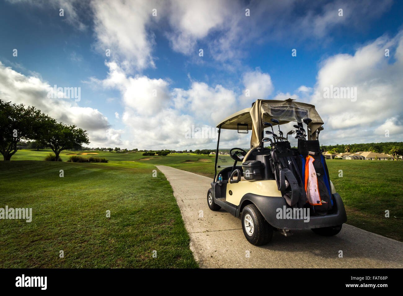 Golf cart on a sunny day Stock Photo - Alamy