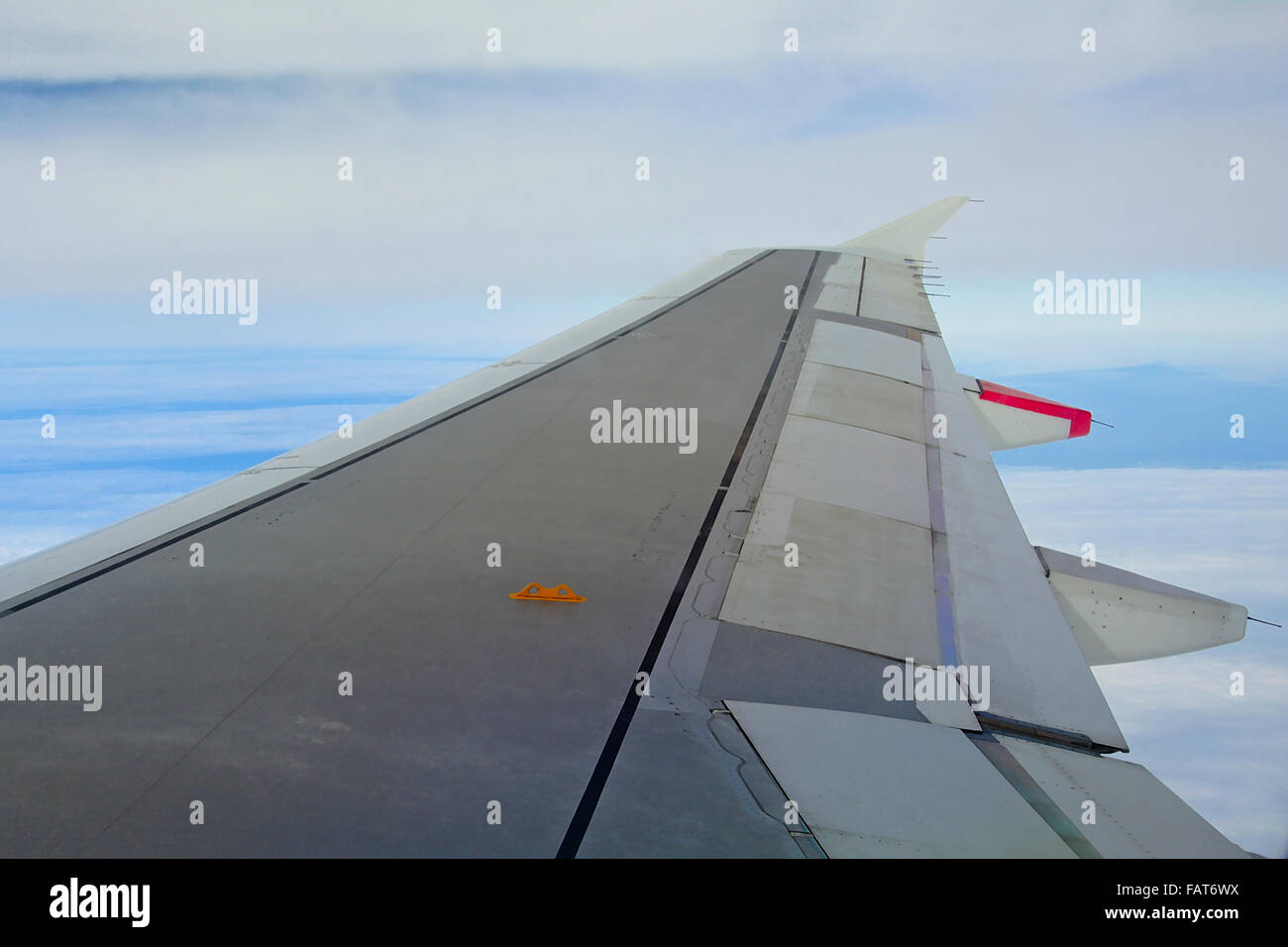 Airplane wing, view from inside the airplane Stock Photo - Alamy