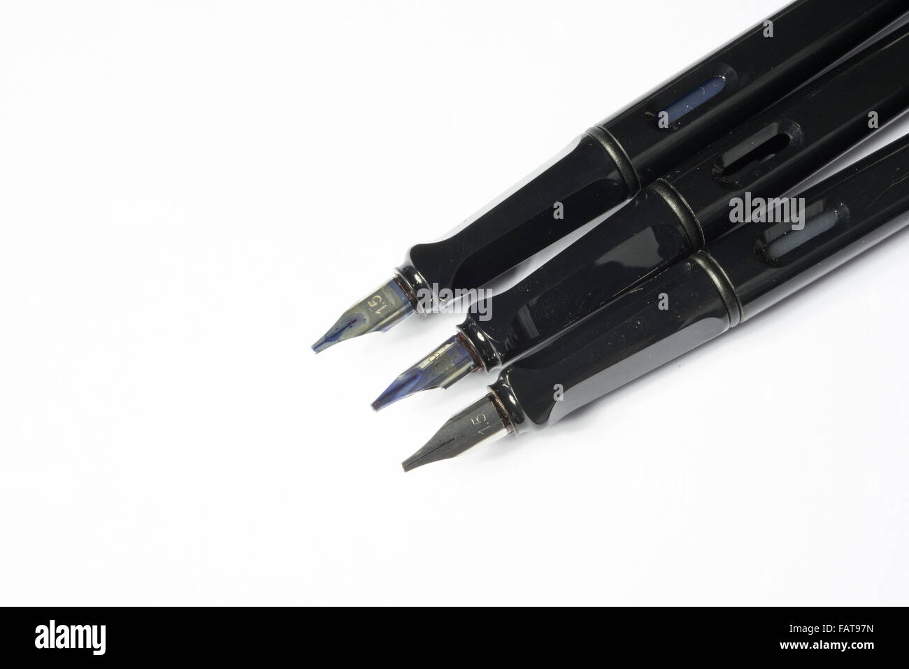 close up of used fountain pens isolated on white Stock Photo - Alamy