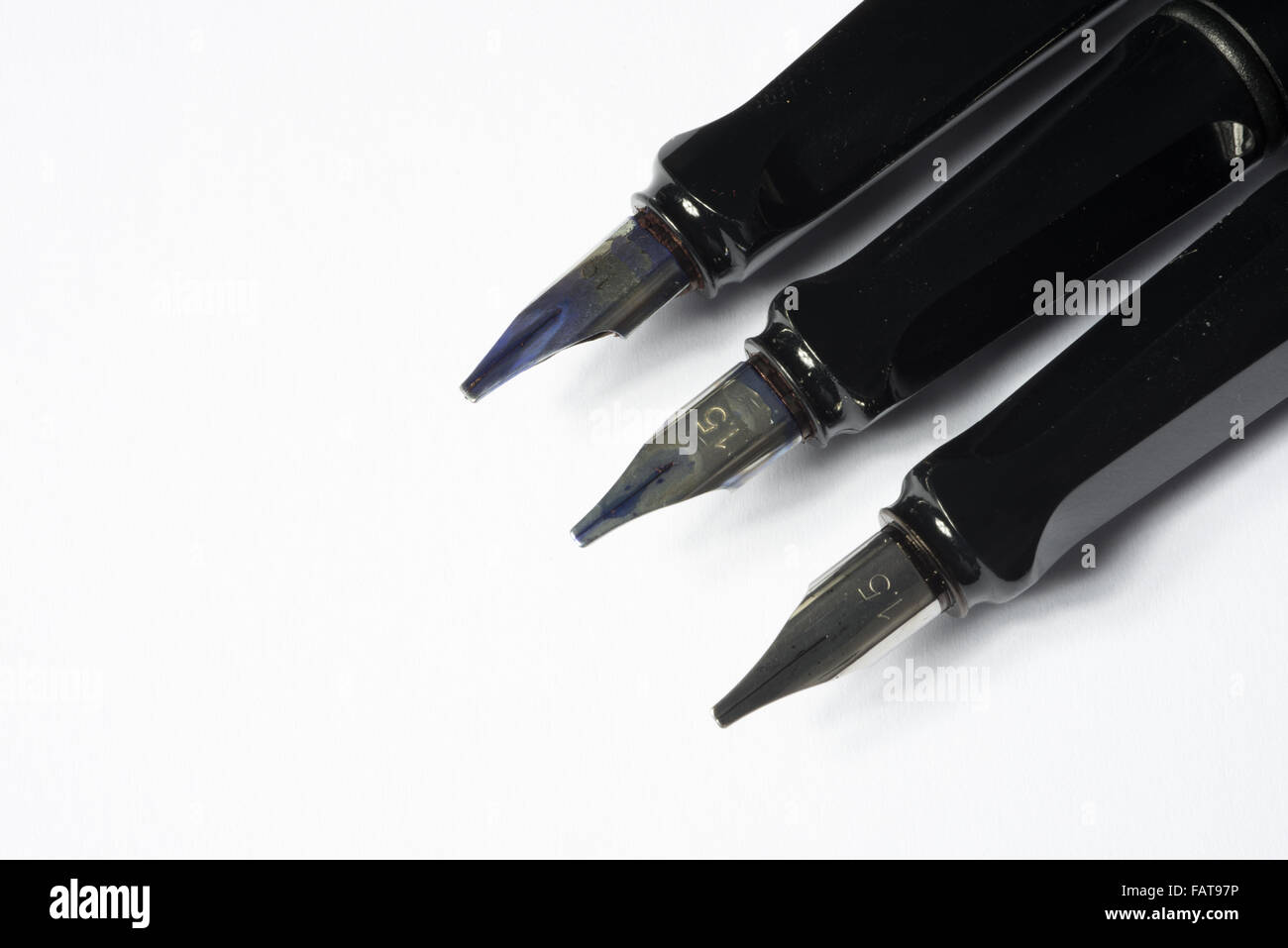 close up of used fountain pens isolated on white Stock Photo - Alamy