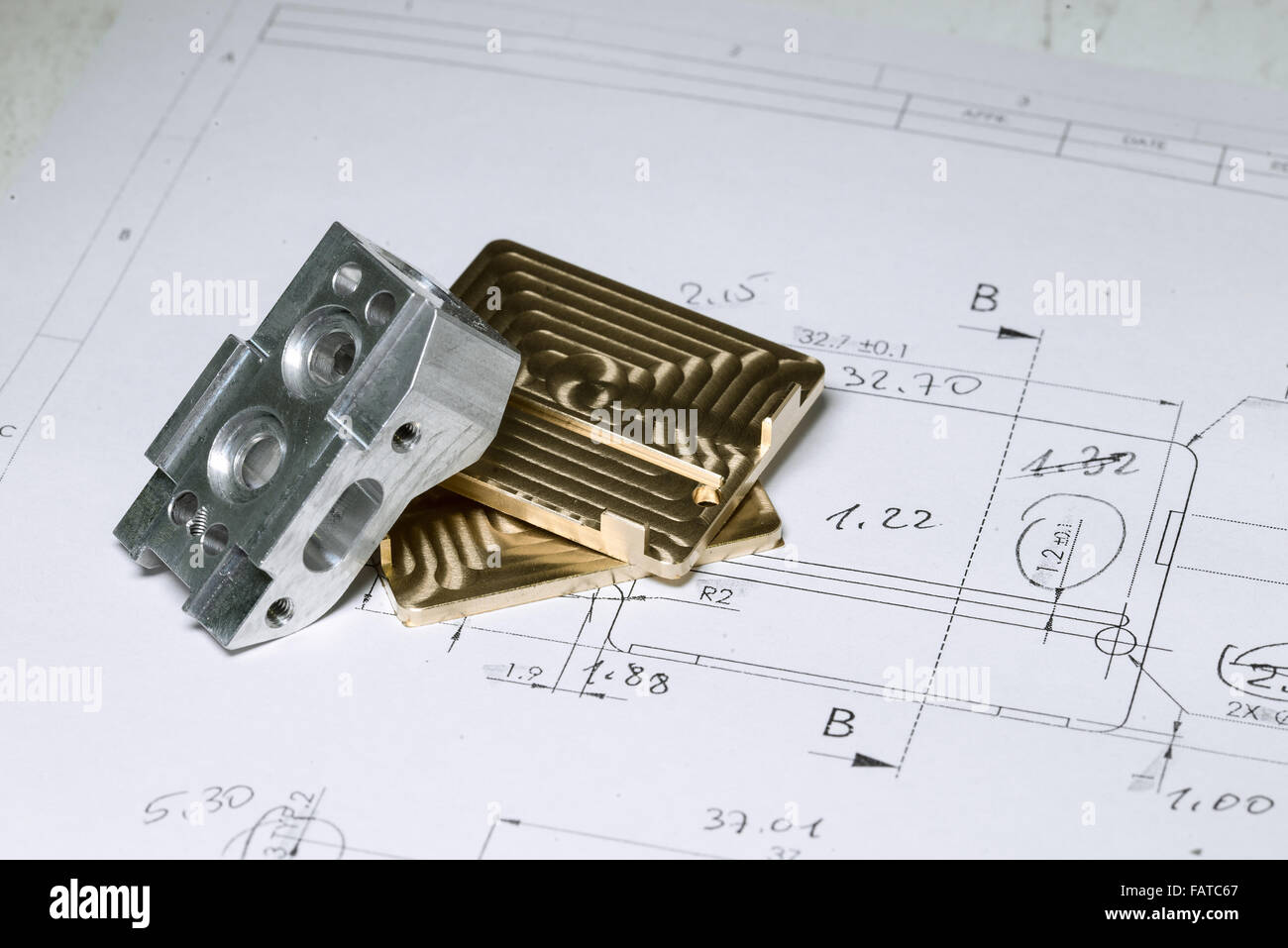 Ready CNC golden and silver metal detail on technical drawing sketch ...