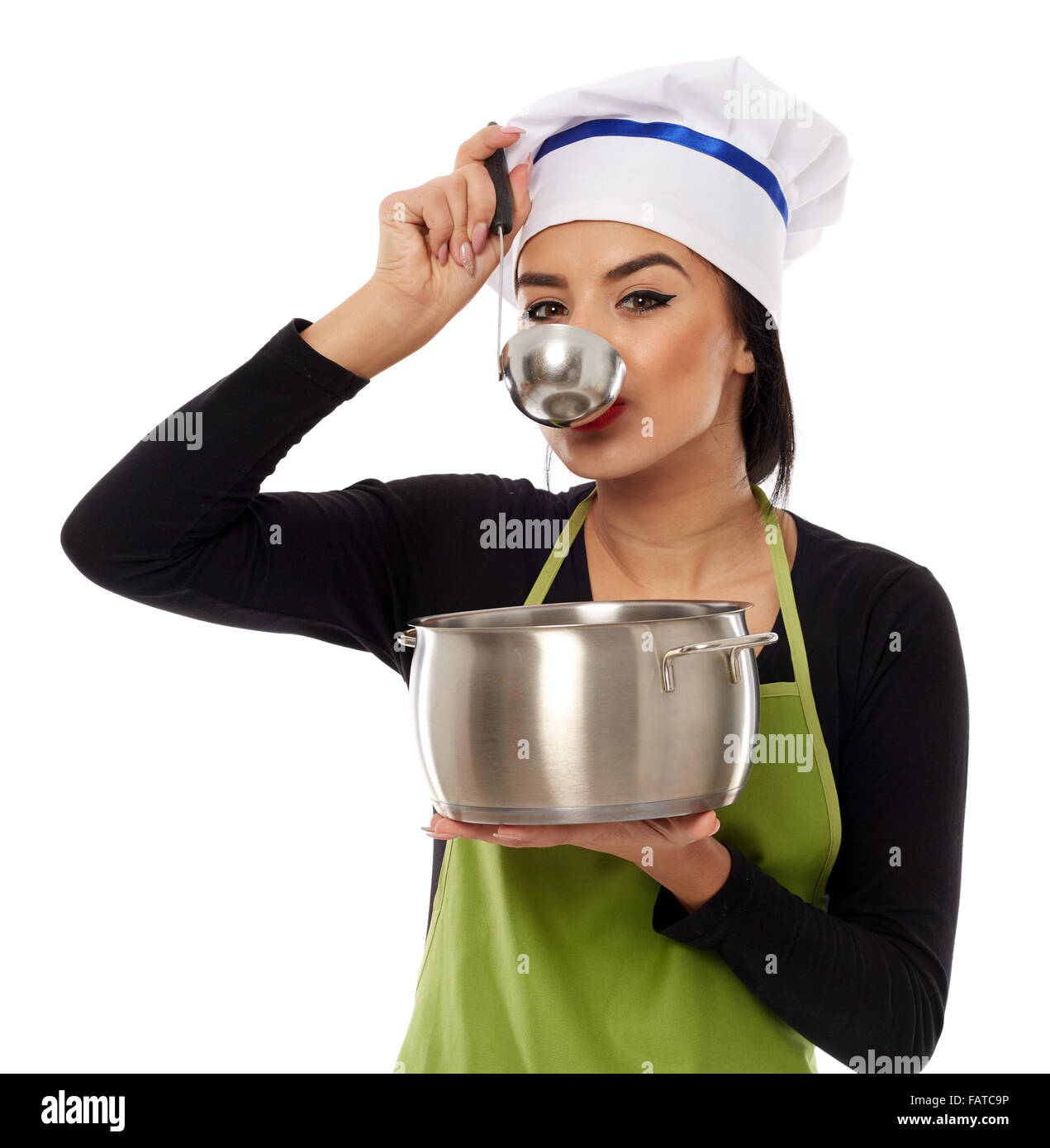 Latino woman chef tasting soup with a ladle, isolated on white Stock ...