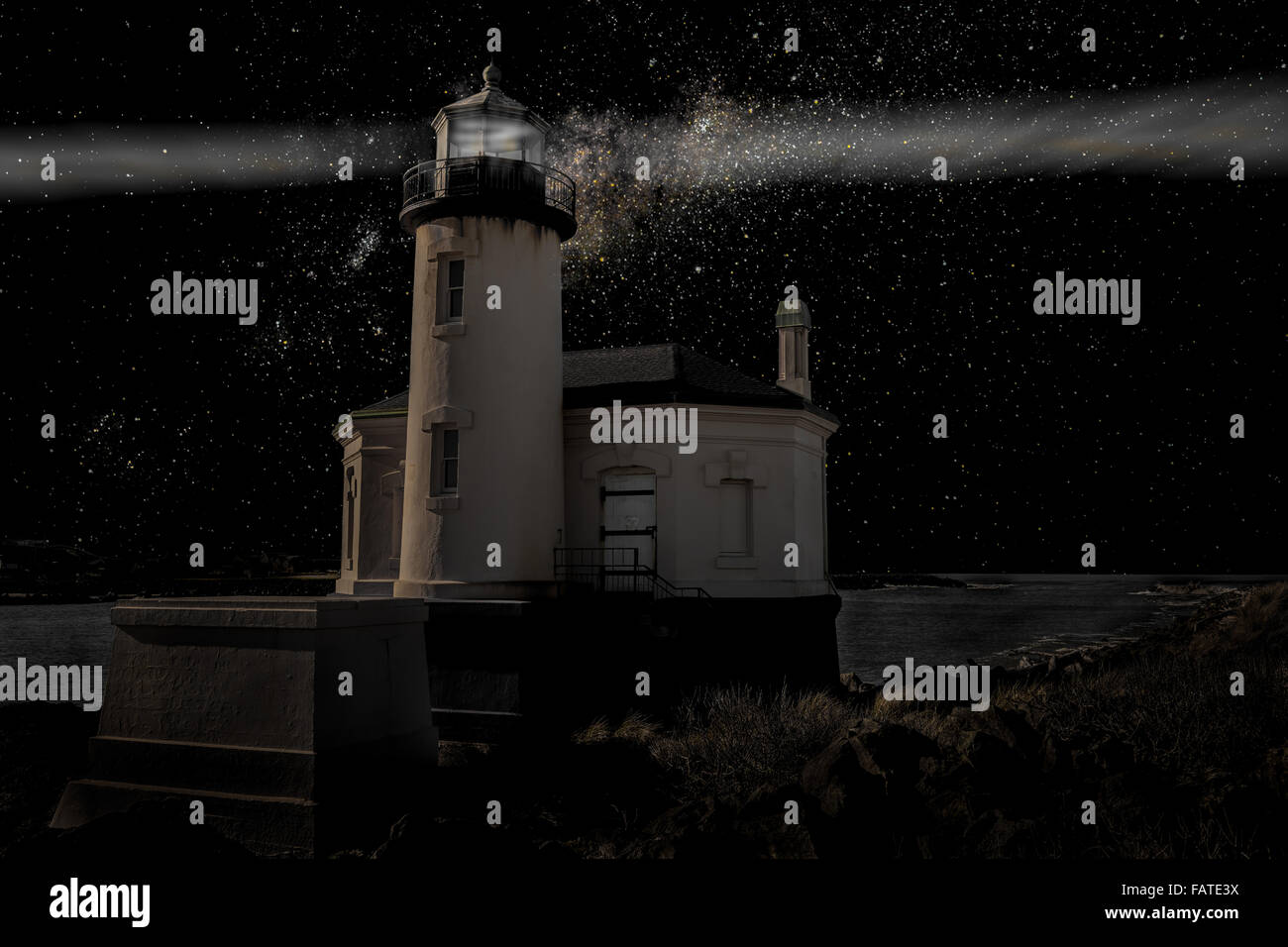 A lighthouse shine in the night Stock Photo - Alamy