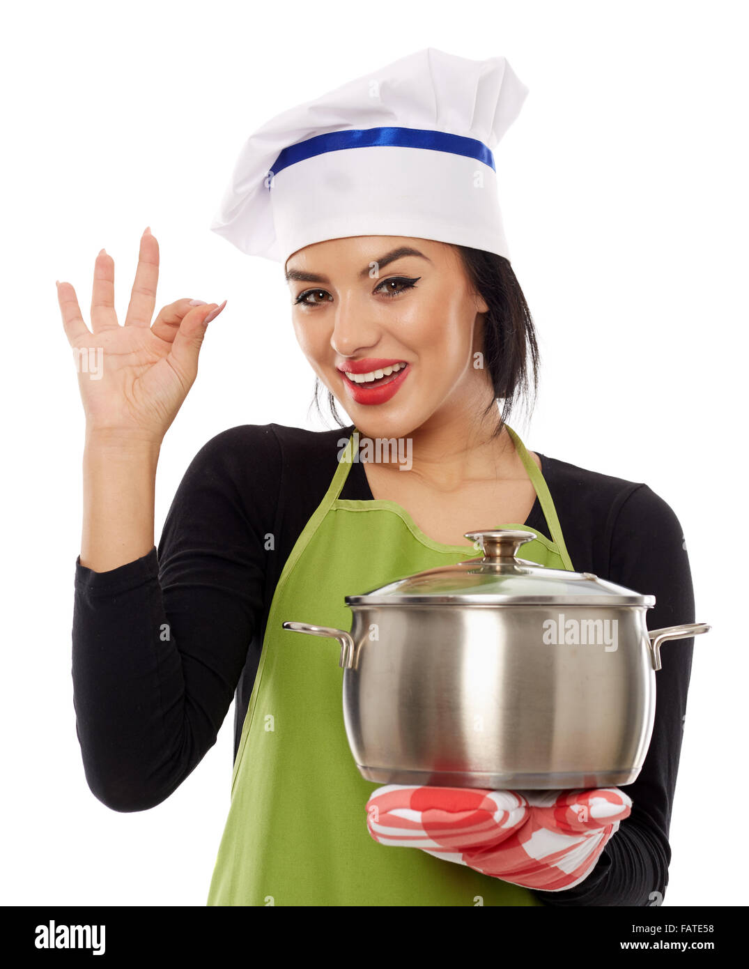 Beatiful woman with oven glove holding a stainless pot Stock Photo - Alamy