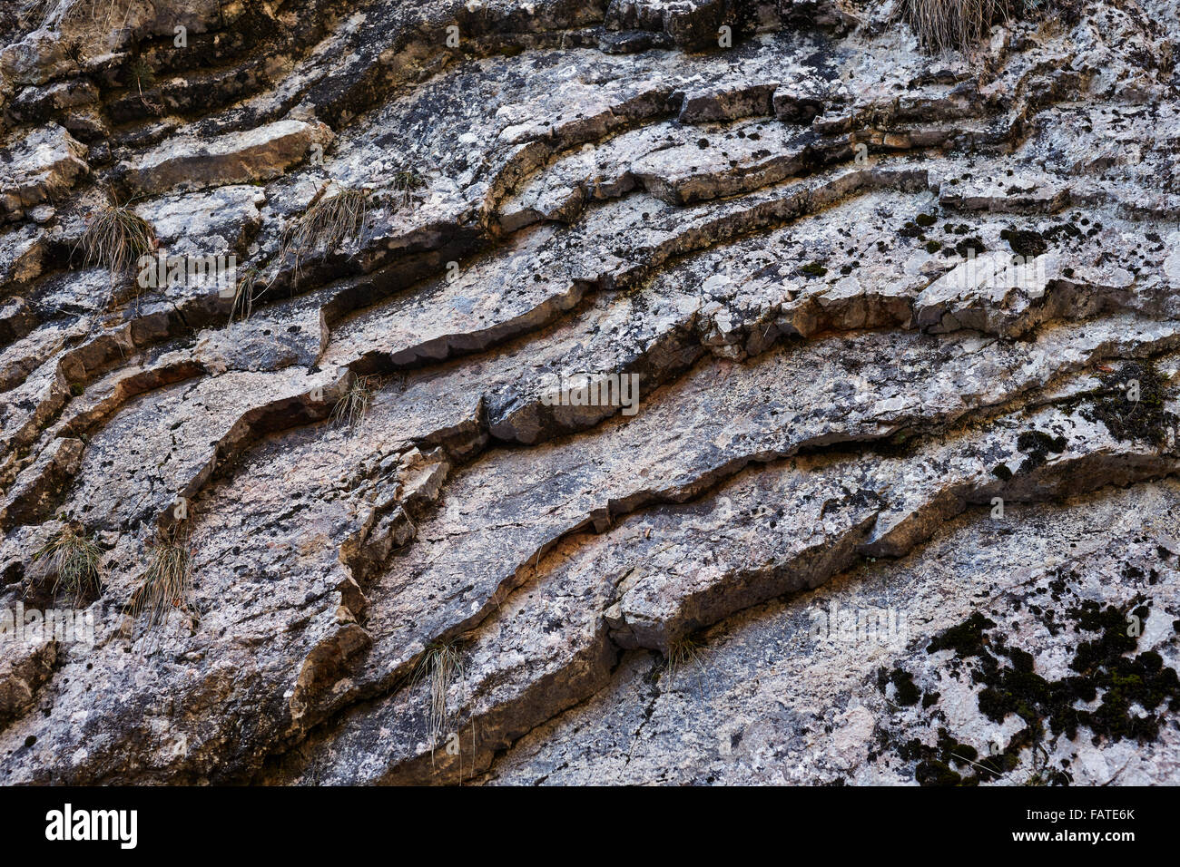 Closeup of a sedimentary mountain limestone rocks, with selective focus ...