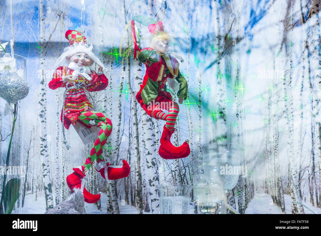 Christmas elves in shop window Stock Photo - Alamy