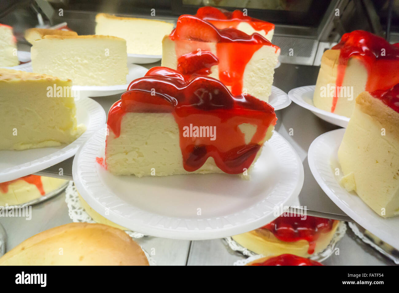 Cheesecakes are seen in a display in a delicatessen in New York on ...