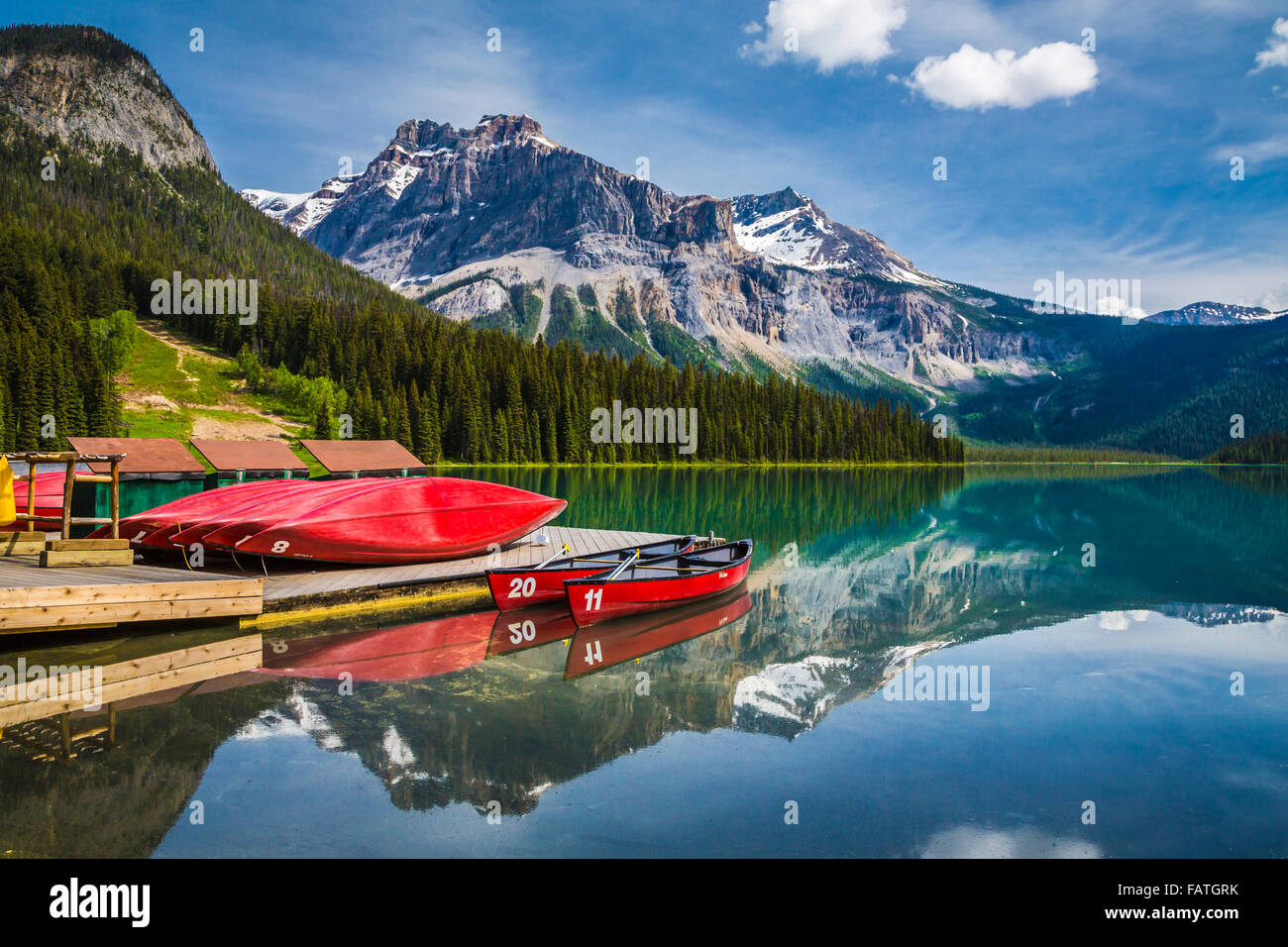 Red canoes on the dock at Emerald Lake, Yoho National Park, British ...