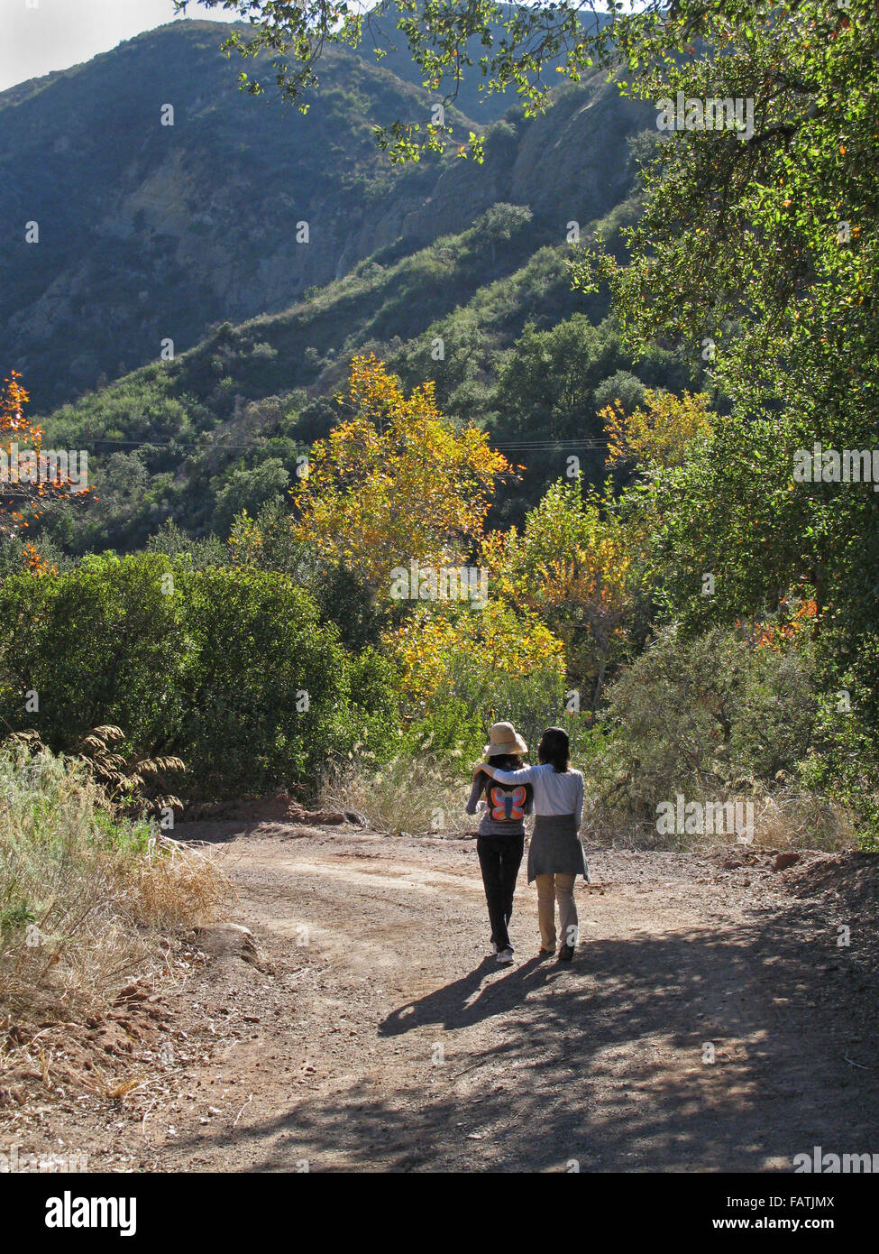 two girls on nature hike Stock Photo - Alamy