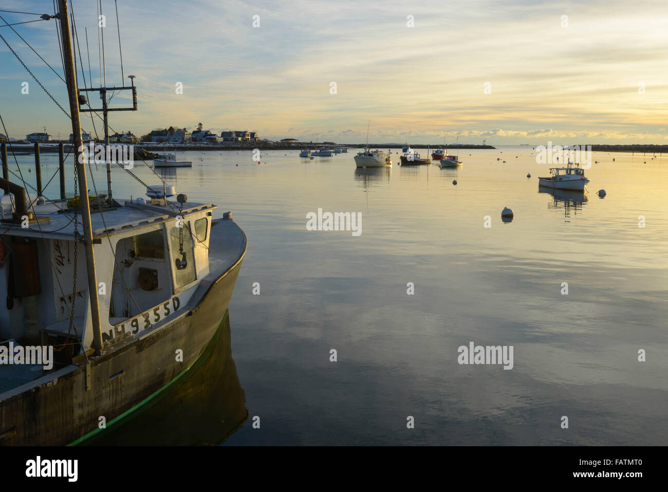 Rye Harbor fishing boats at sunrise in winter, New Hampshire seacoast ...