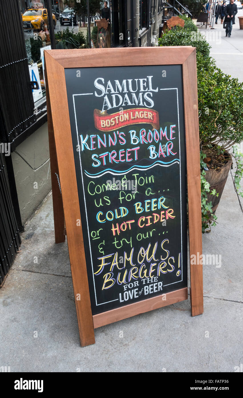 Folding street sign outside a Soho bar in New York City Stock Photo - Alamy