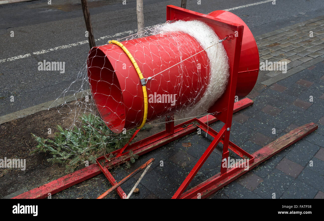 A red Christmas tree wrapper Stock Photo - Alamy