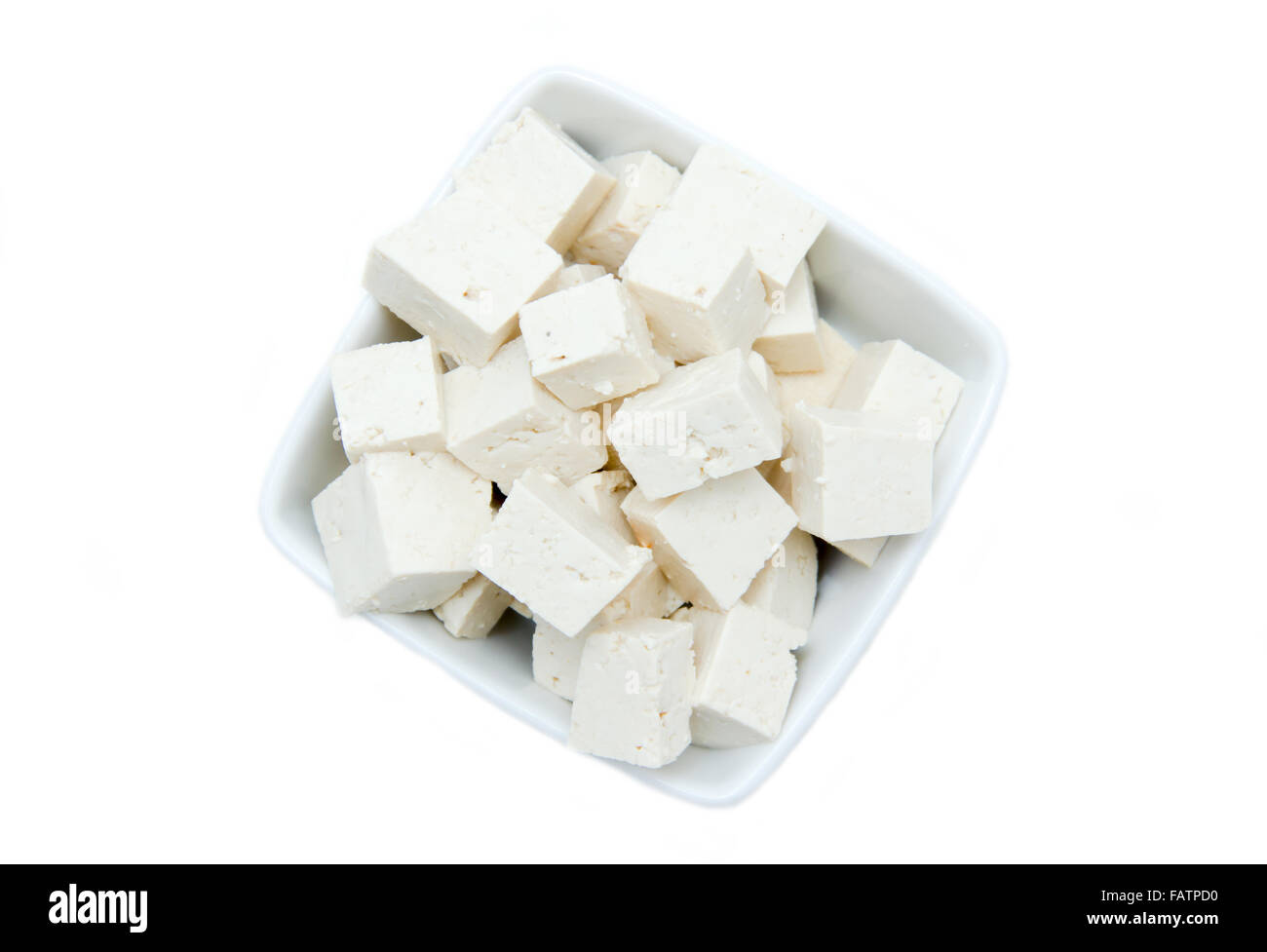 Cubes of tofu square bowl on a white background seen from above Stock ...