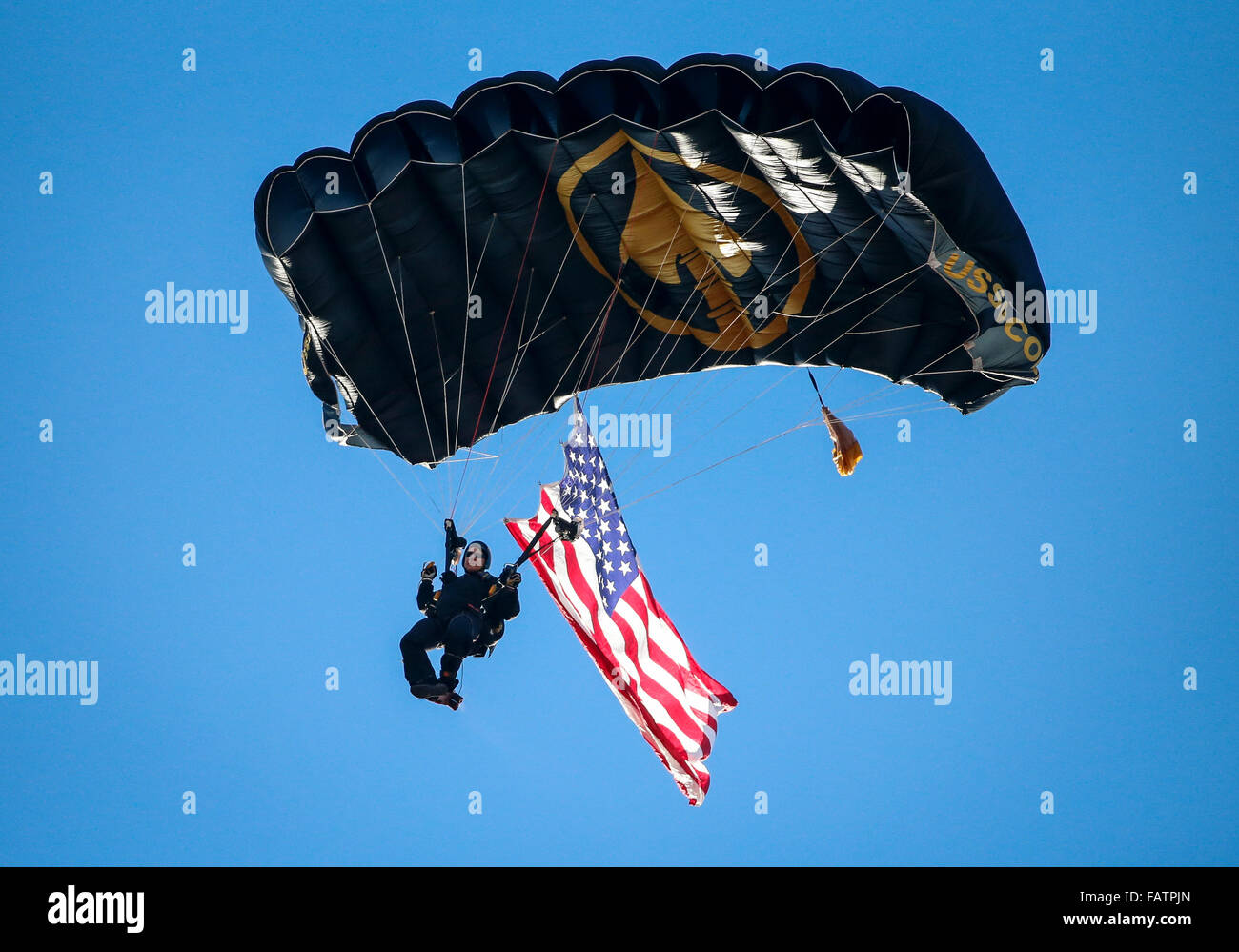Kansas City, MO, USA. 3rd Jan, 2016. Navy Seals parachute into the ...