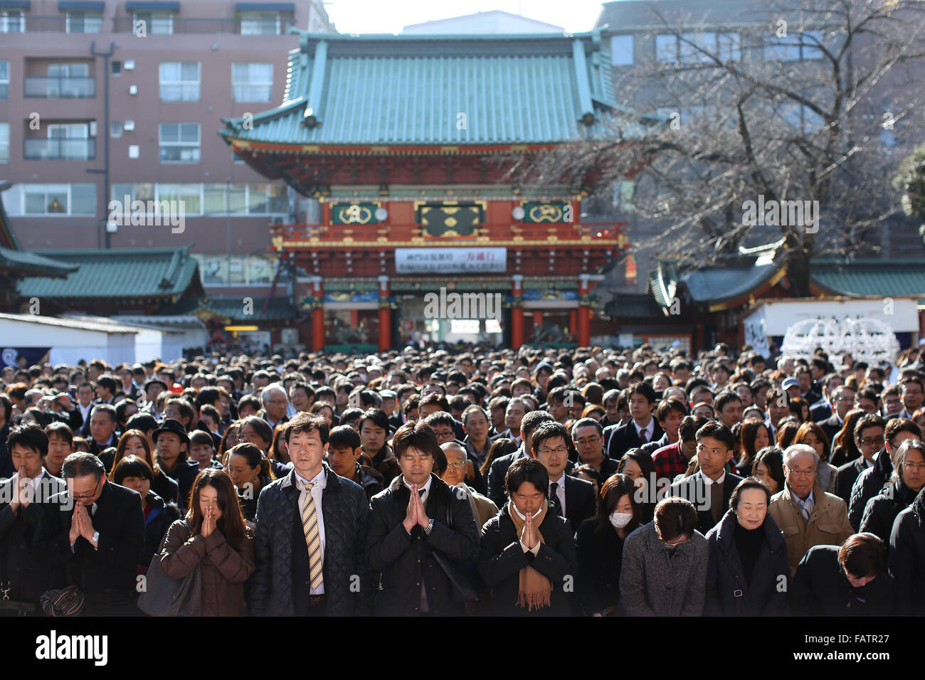 Tokyo, Japan. 4th Jan, 2016. Visitors pray at the Kanda Myojin Shrine ...