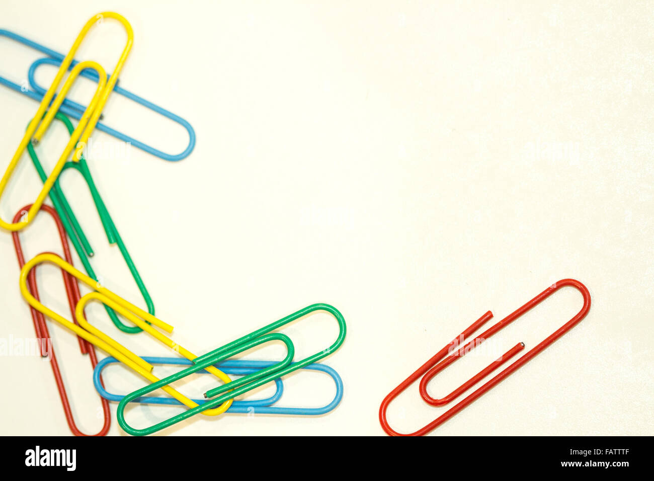 A chain of mutli-colored paper clips Stock Photo - Alamy