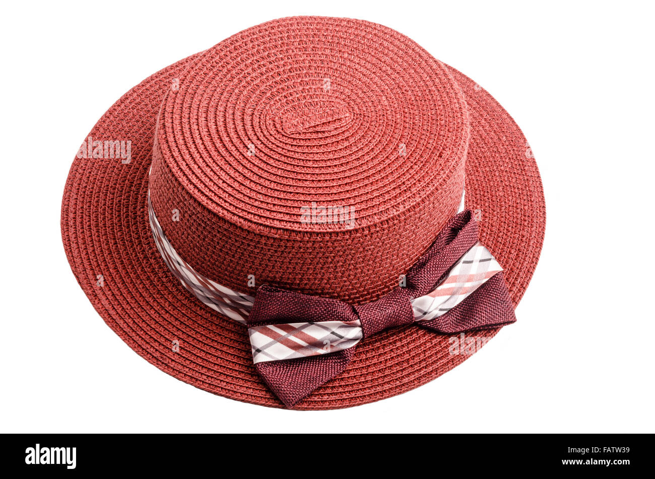 Pretty straw red hat on white background Stock Photo - Alamy