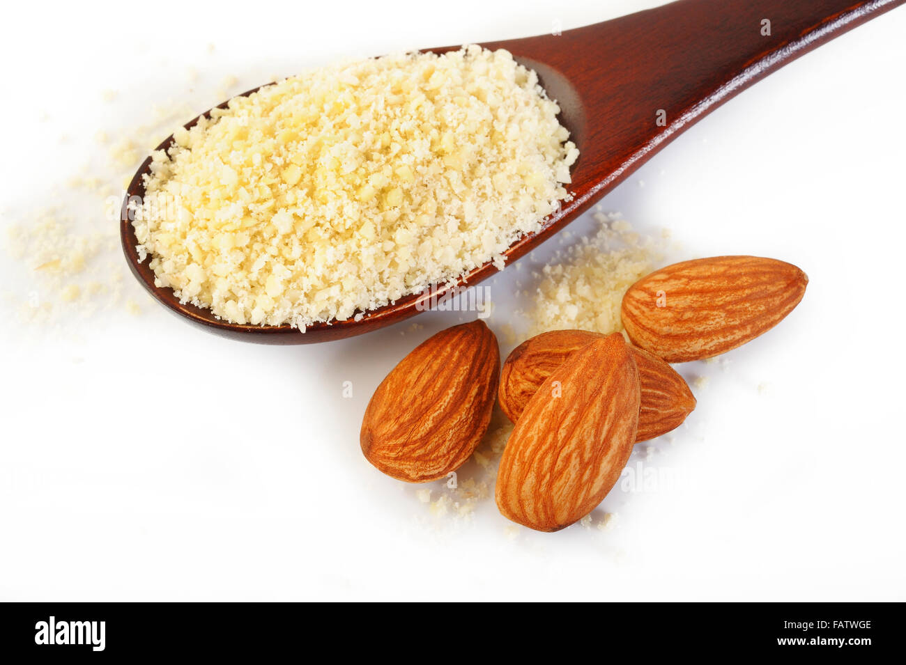 Ground almond in a wooden spoon Stock Photo - Alamy