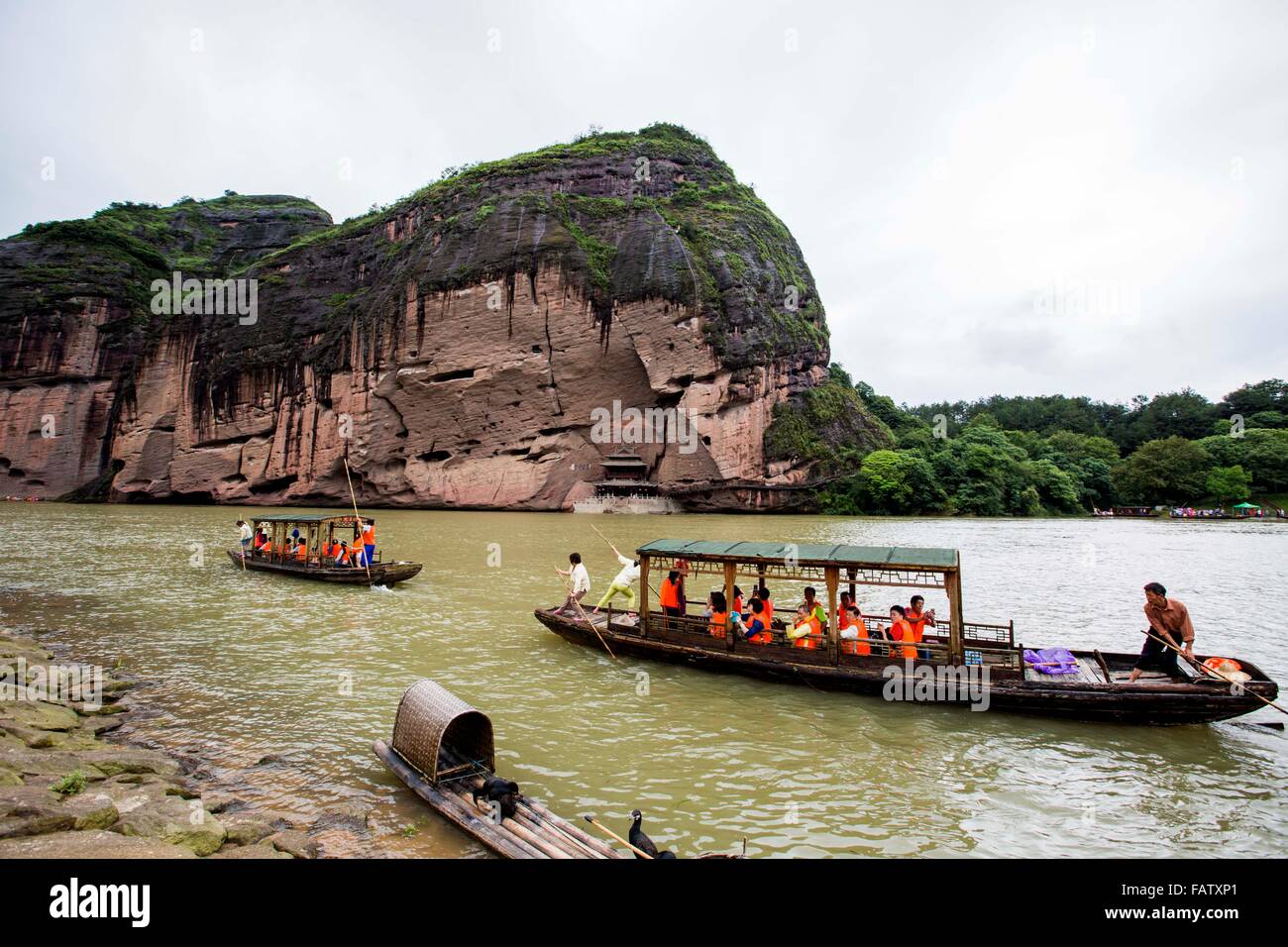 Yingtan, China's Jiangxi Province. 13th June, 2015. Tourists take boats ...
