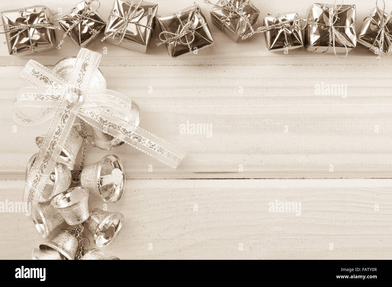Christmas decoration. Silver bell in vintage background Stock Photo - Alamy