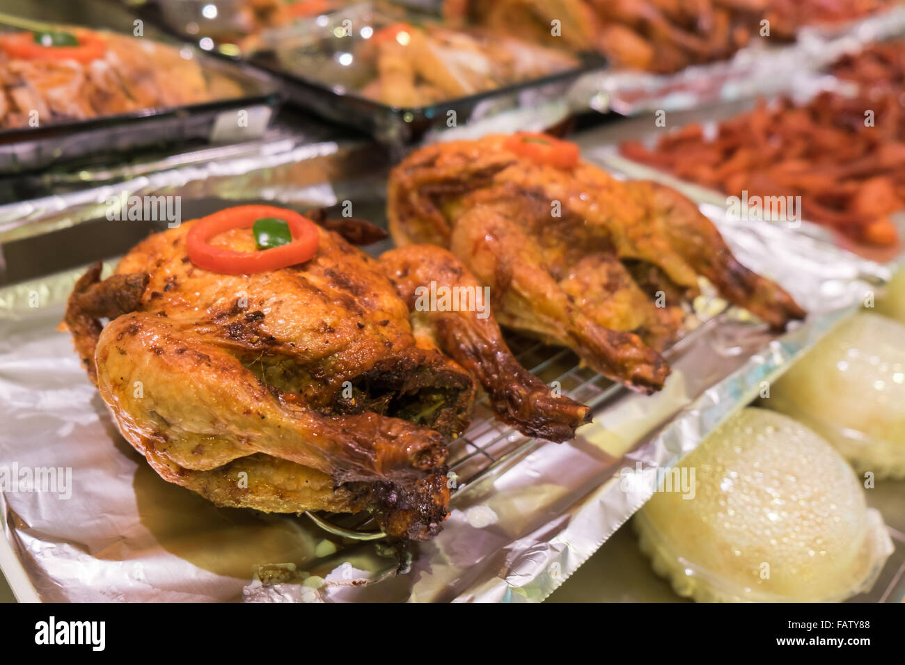 Roasted whole chicken in the fresh market Stock Photo - Alamy