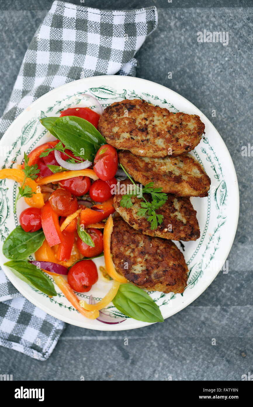 cutlet with tomato, top view Stock Photo - Alamy