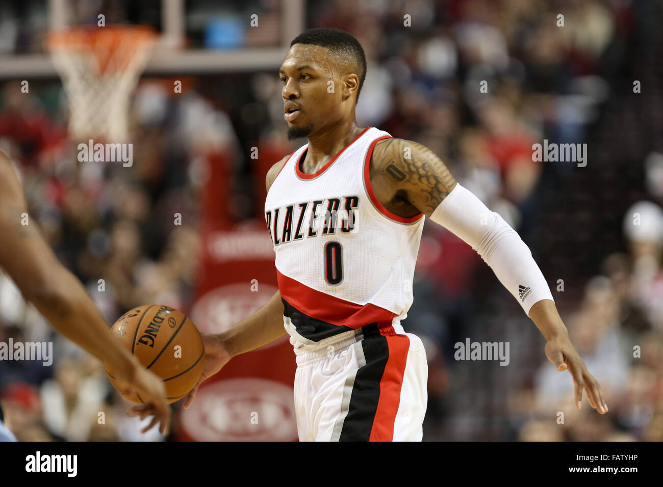 Portland, Oregon, USA. 4th January, 2016. DAMIAN LILLARD (0) controls ...