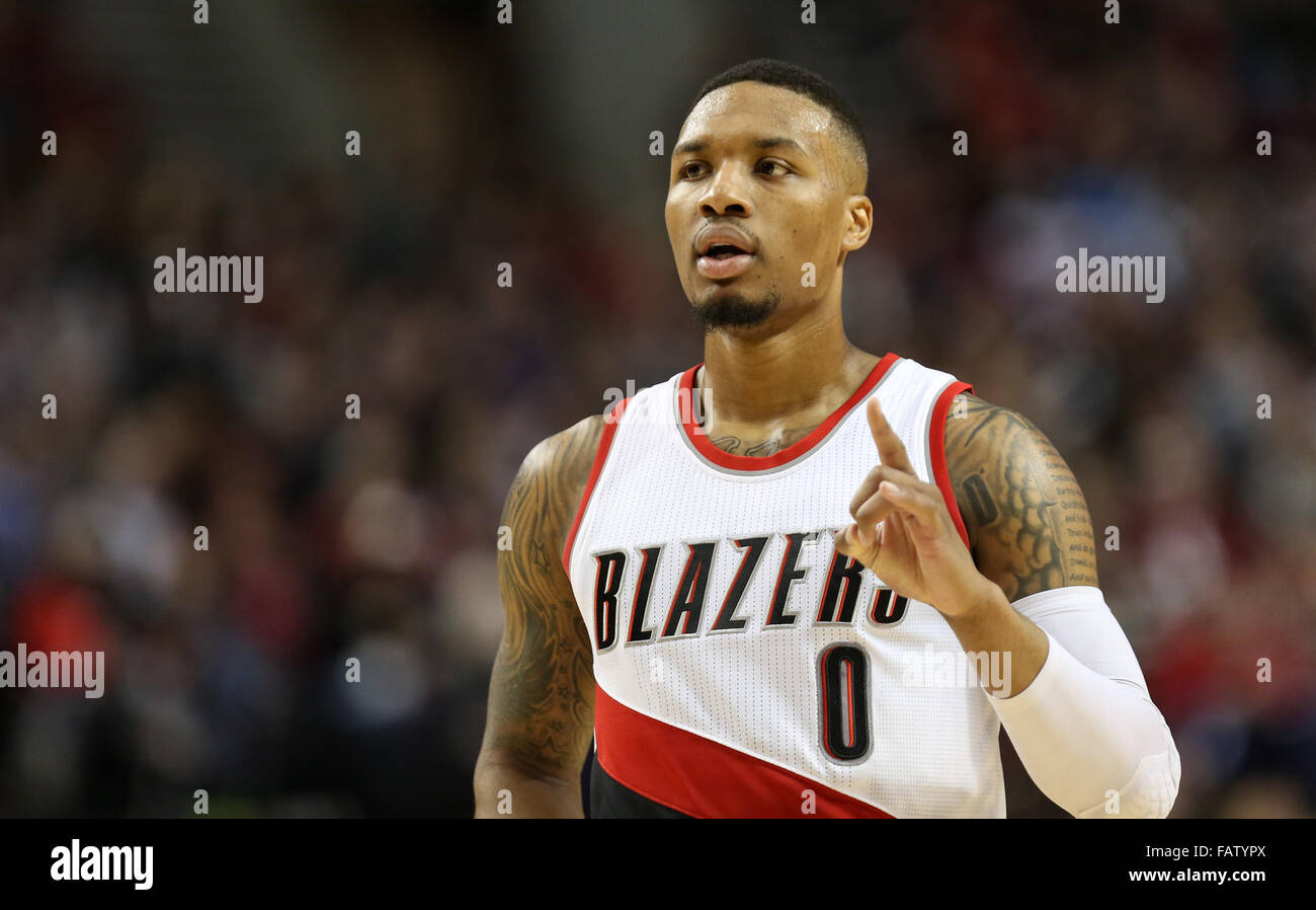 Portland, Oregon, USA. 4th January, 2016. DAMIAN LILLARD (0) calls out ...