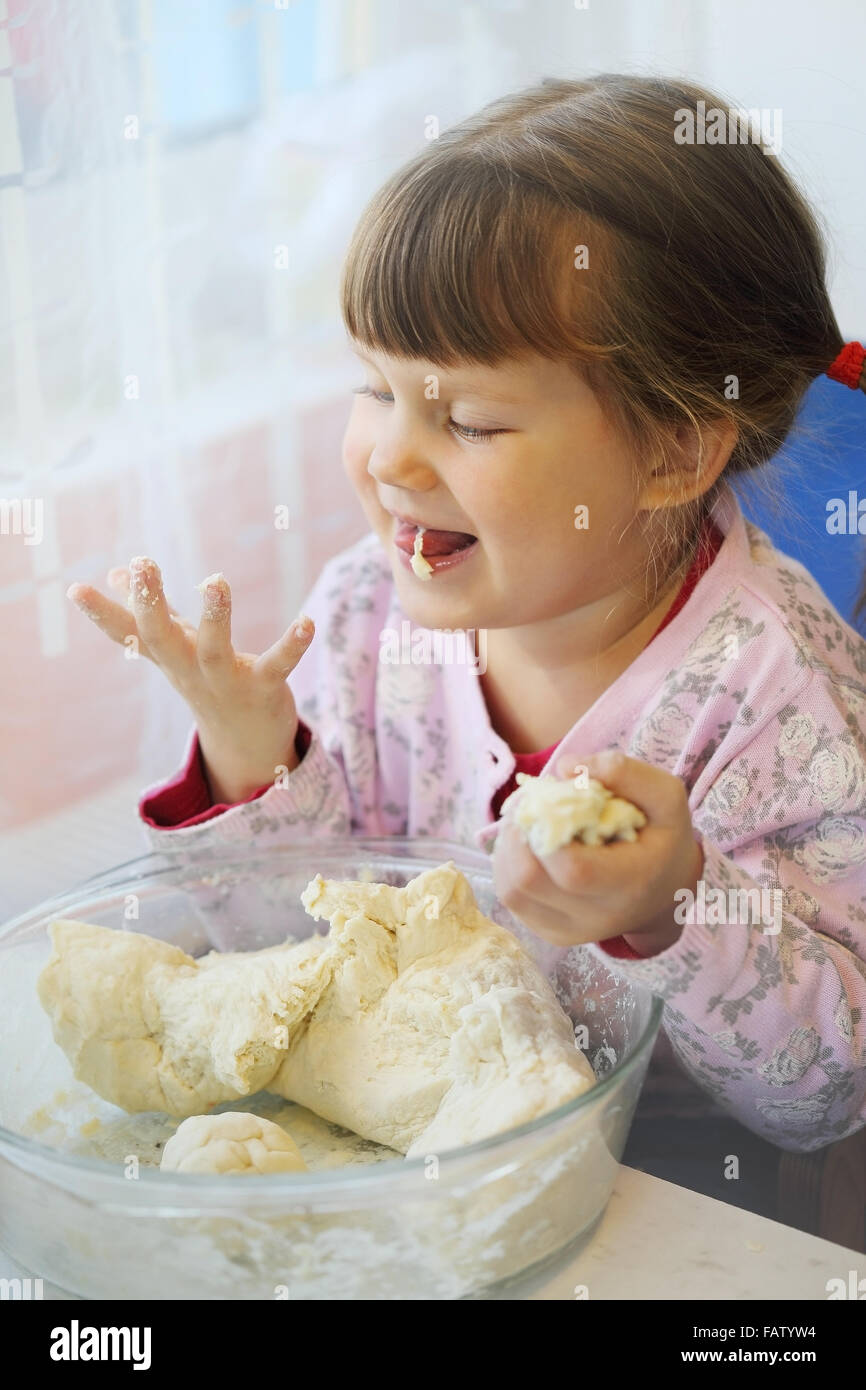 girl eating pastry Stock Photo - Alamy