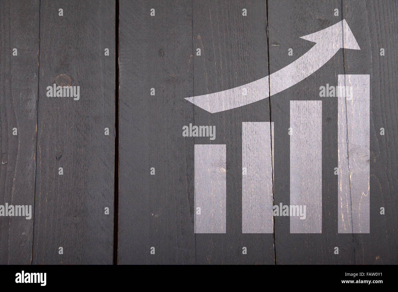 White graph with growth on dark wooden background Stock Photo - Alamy